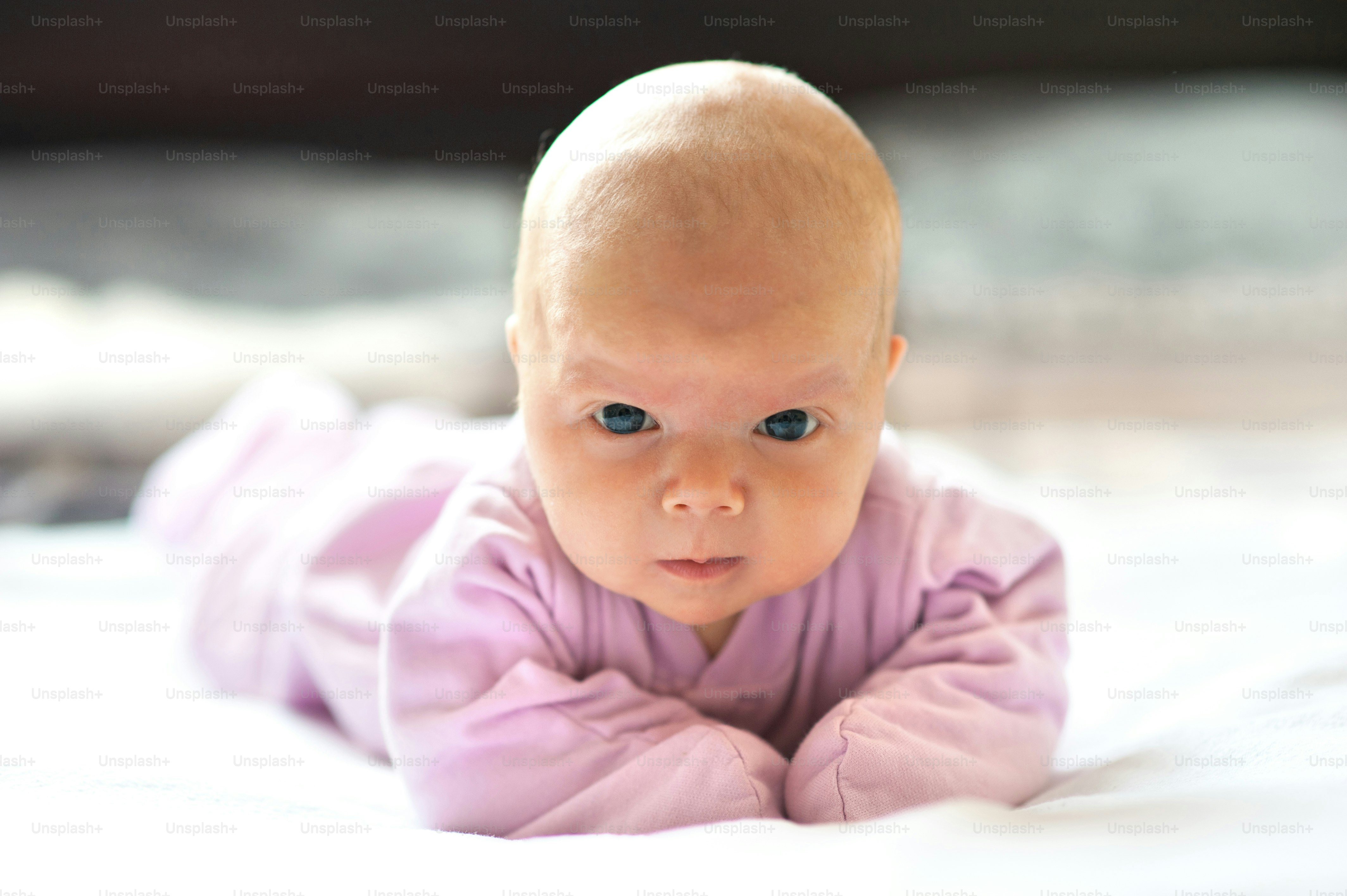 Little baby girl looking at camera photo – Baby Image on Unsplash