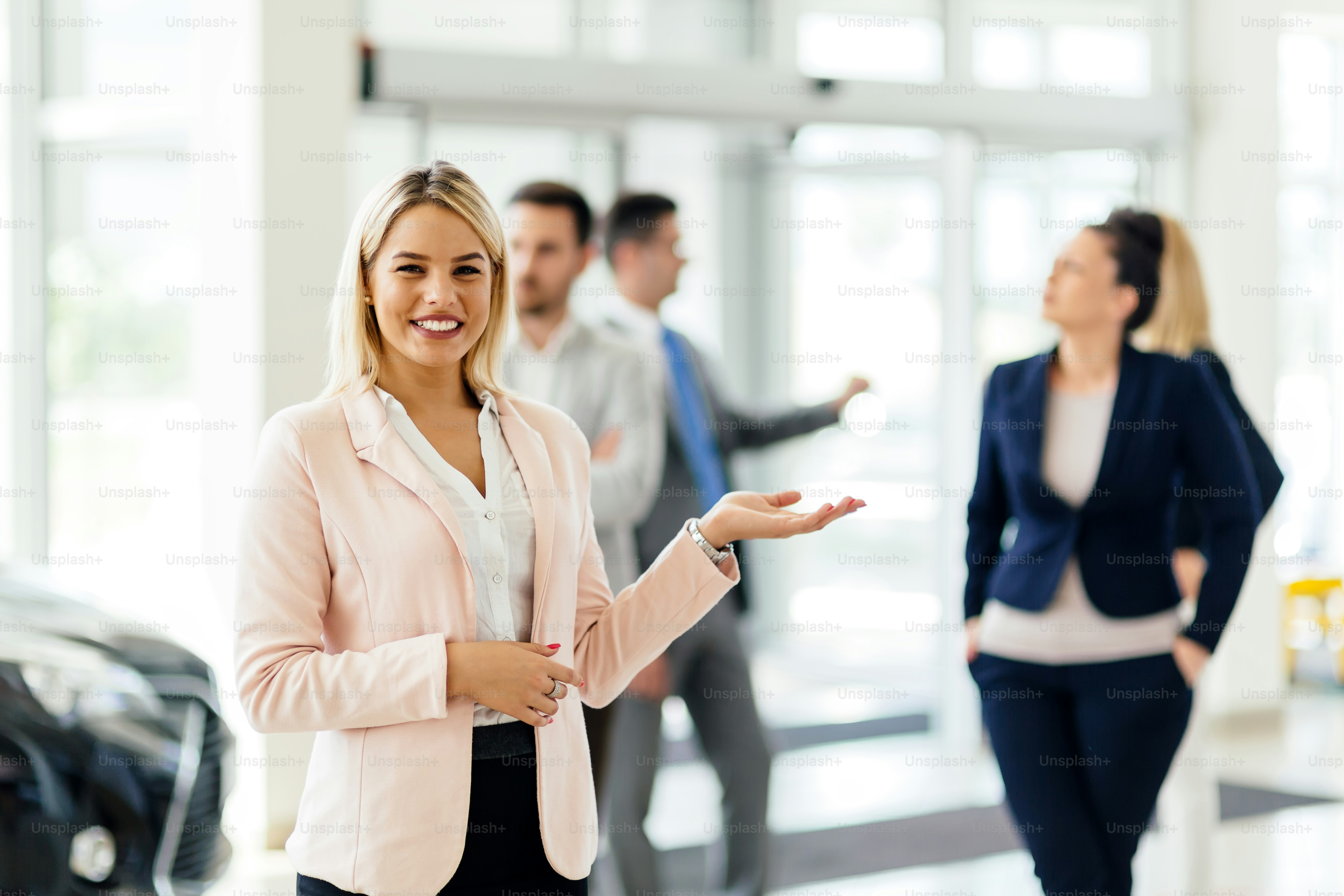 Team of professional salespeople at car dealership photo – Sale Image ...