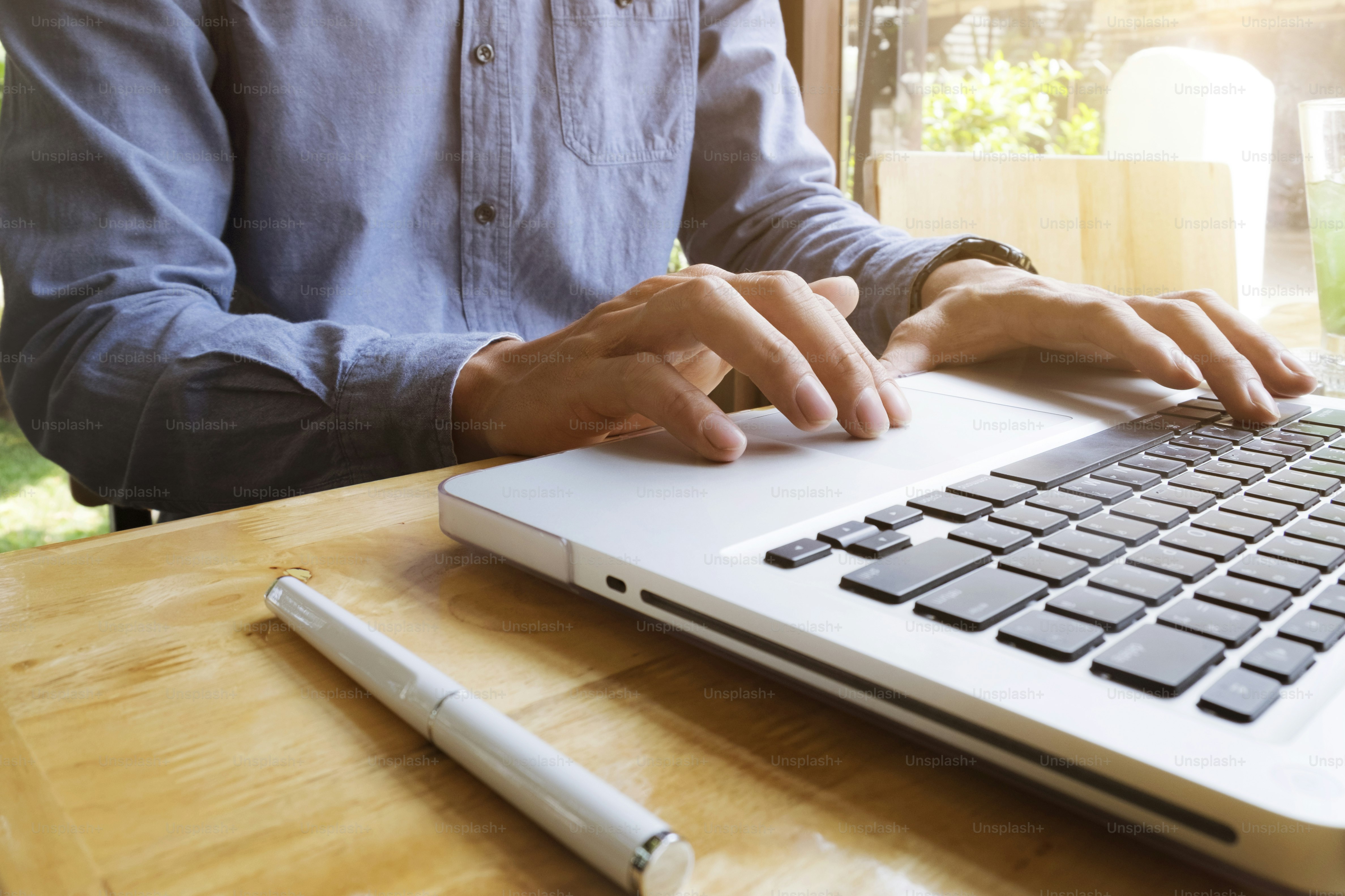 Closeup unusual business or freelance’s hand typing on computer laptop ...