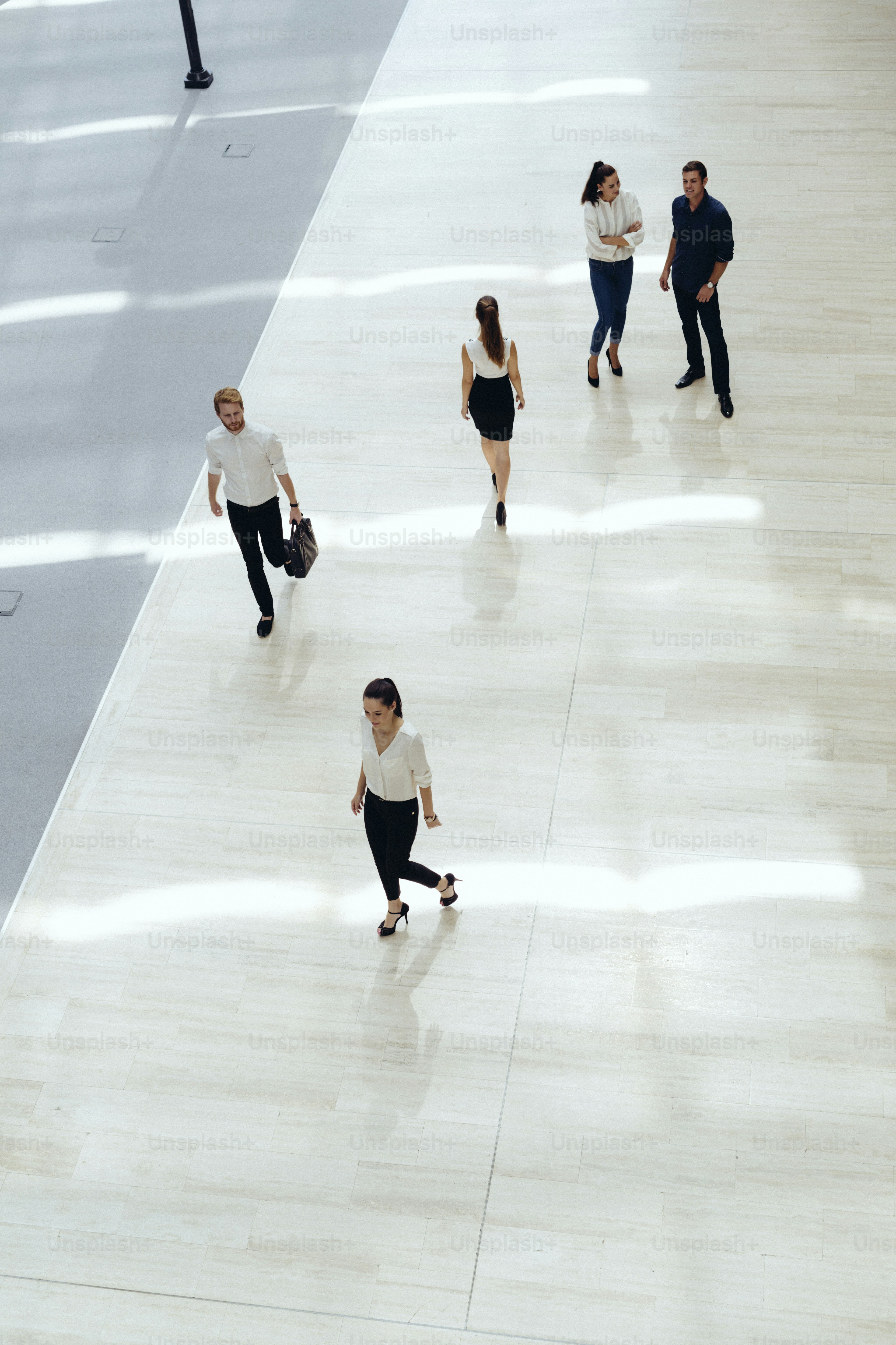 Young business people before starting work in their office photo ...