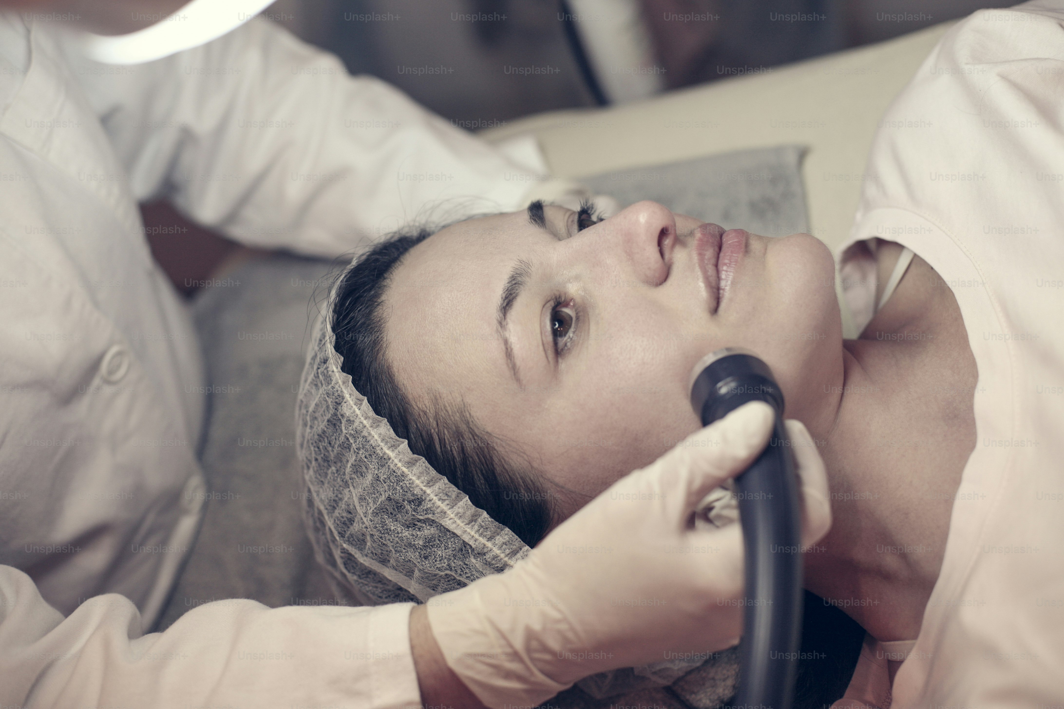 Young woman having ultra sound face. photo – Assistant Image on Unsplash