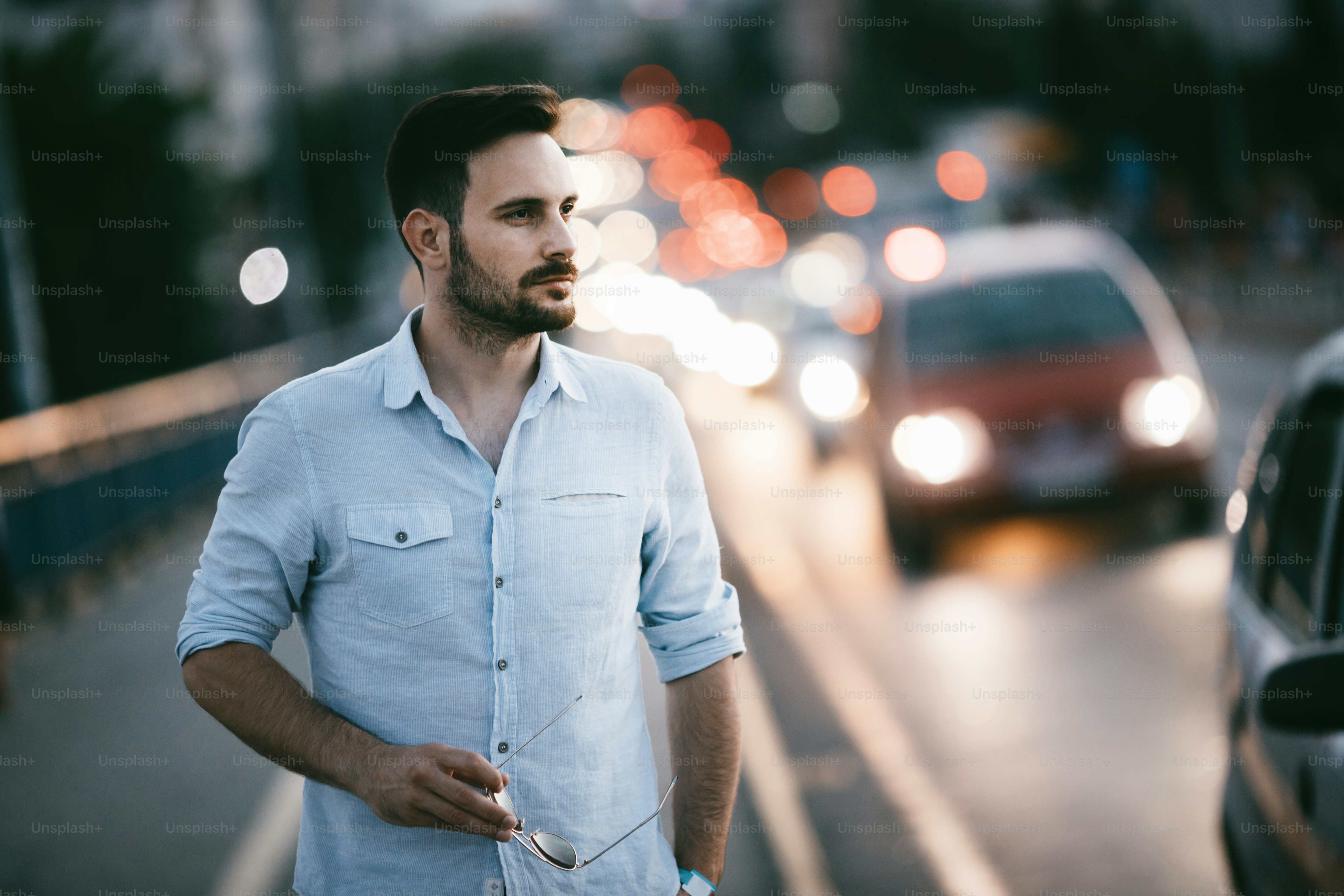 Handsome man walking home at night alone in city photo – Men shirt ...