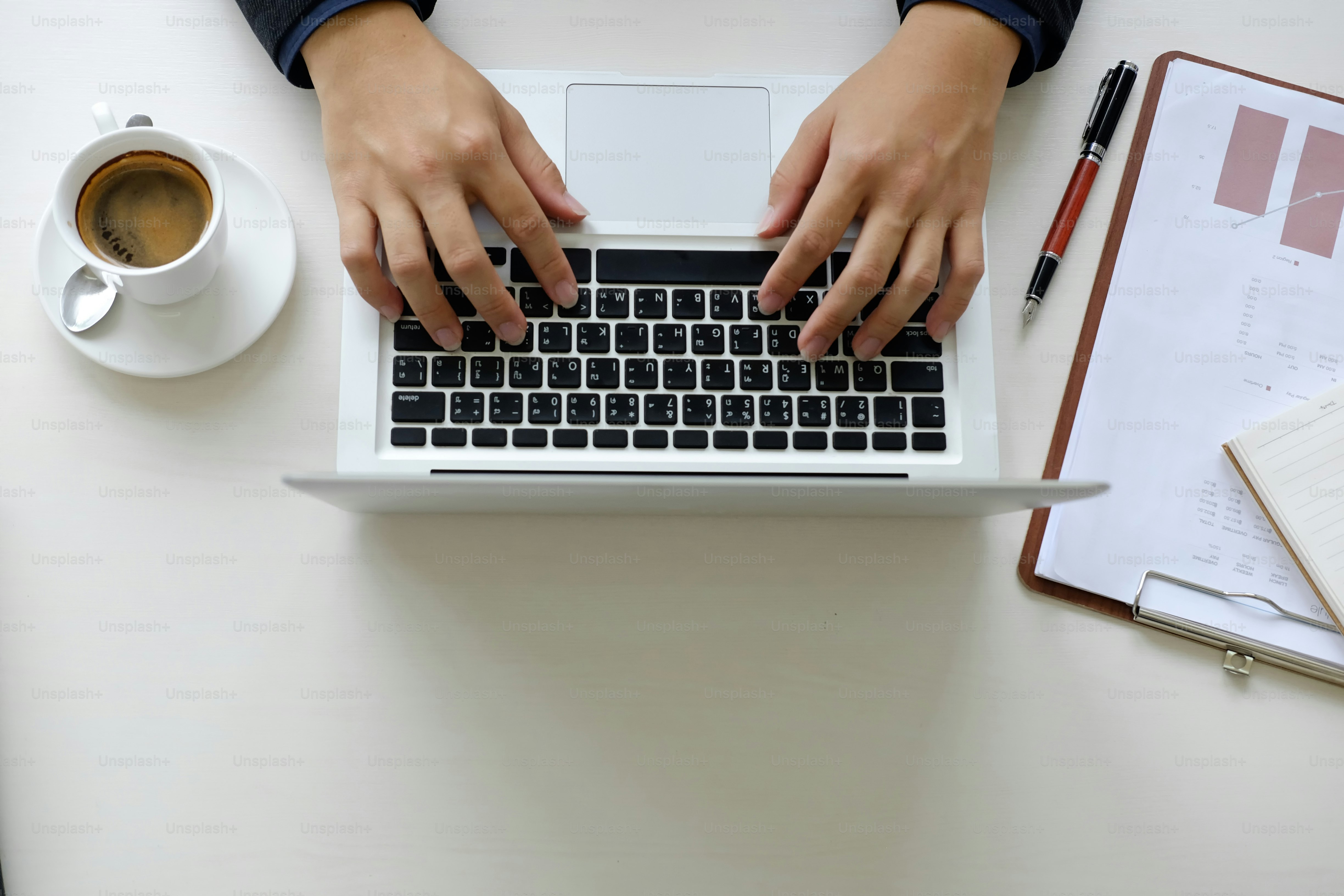 Business man hand using laptop computer with top view. photo ...