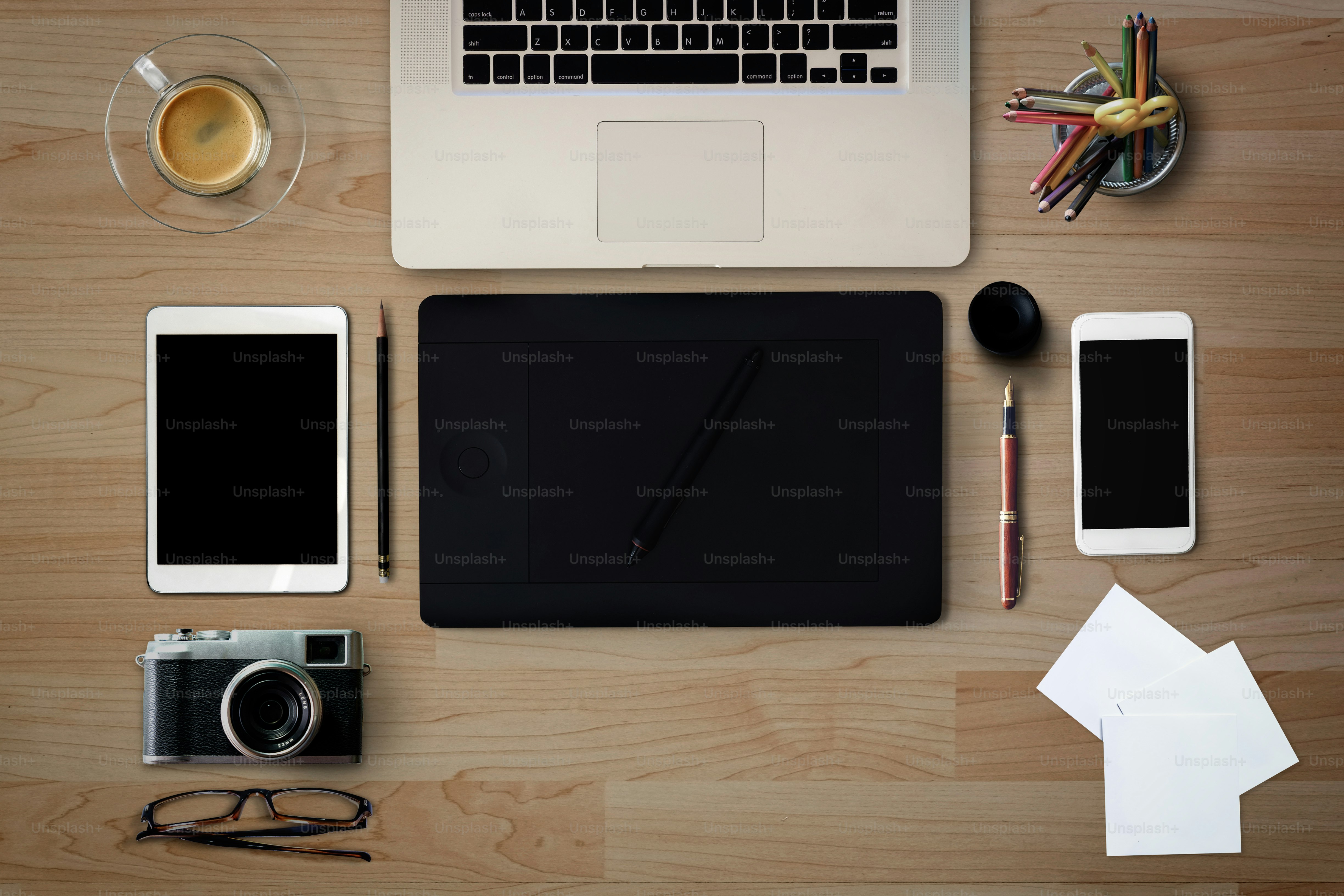 Creative professional designer's desk with designer digital tablet from ...