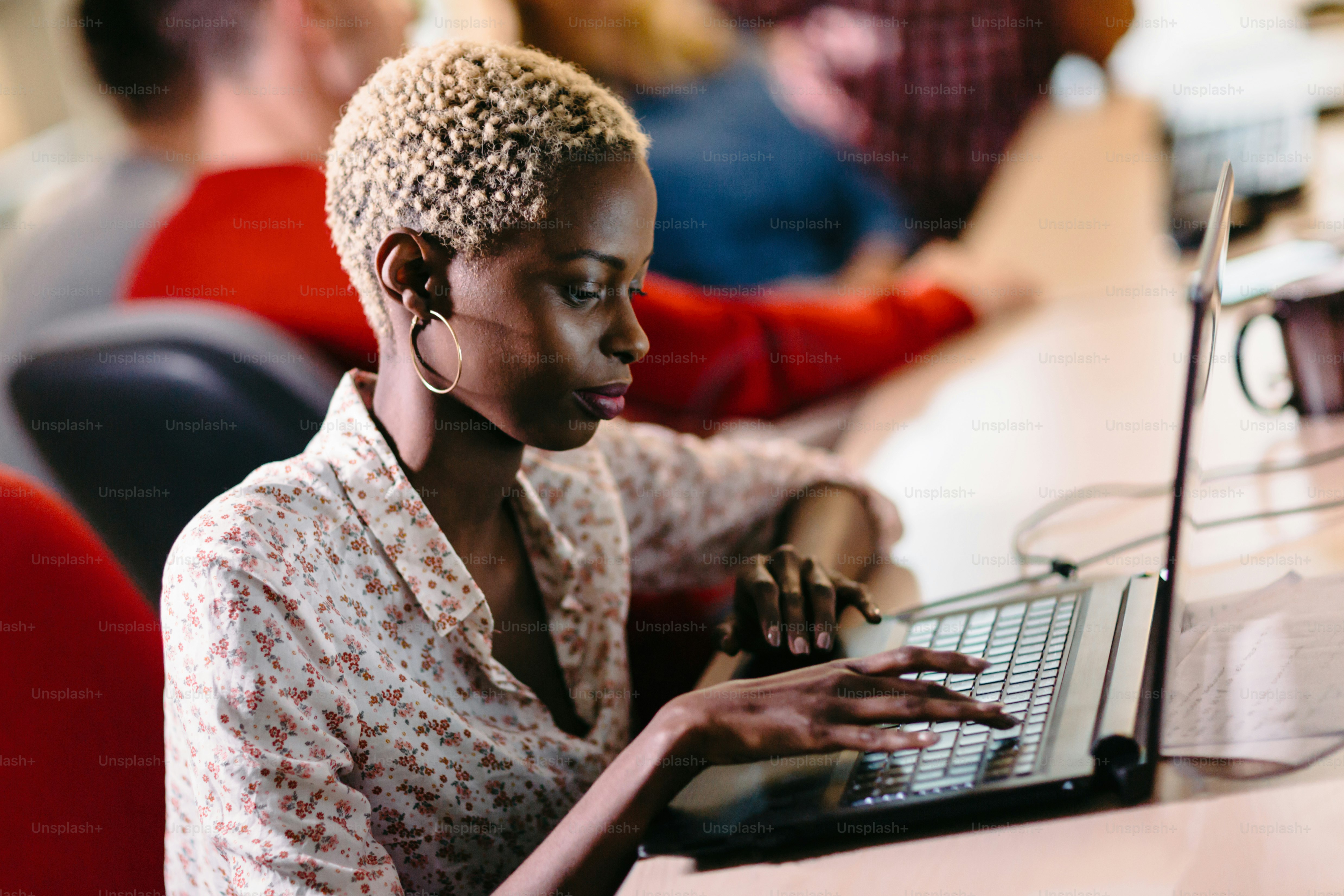 Portait of female software designer working in office photo – Computer ...