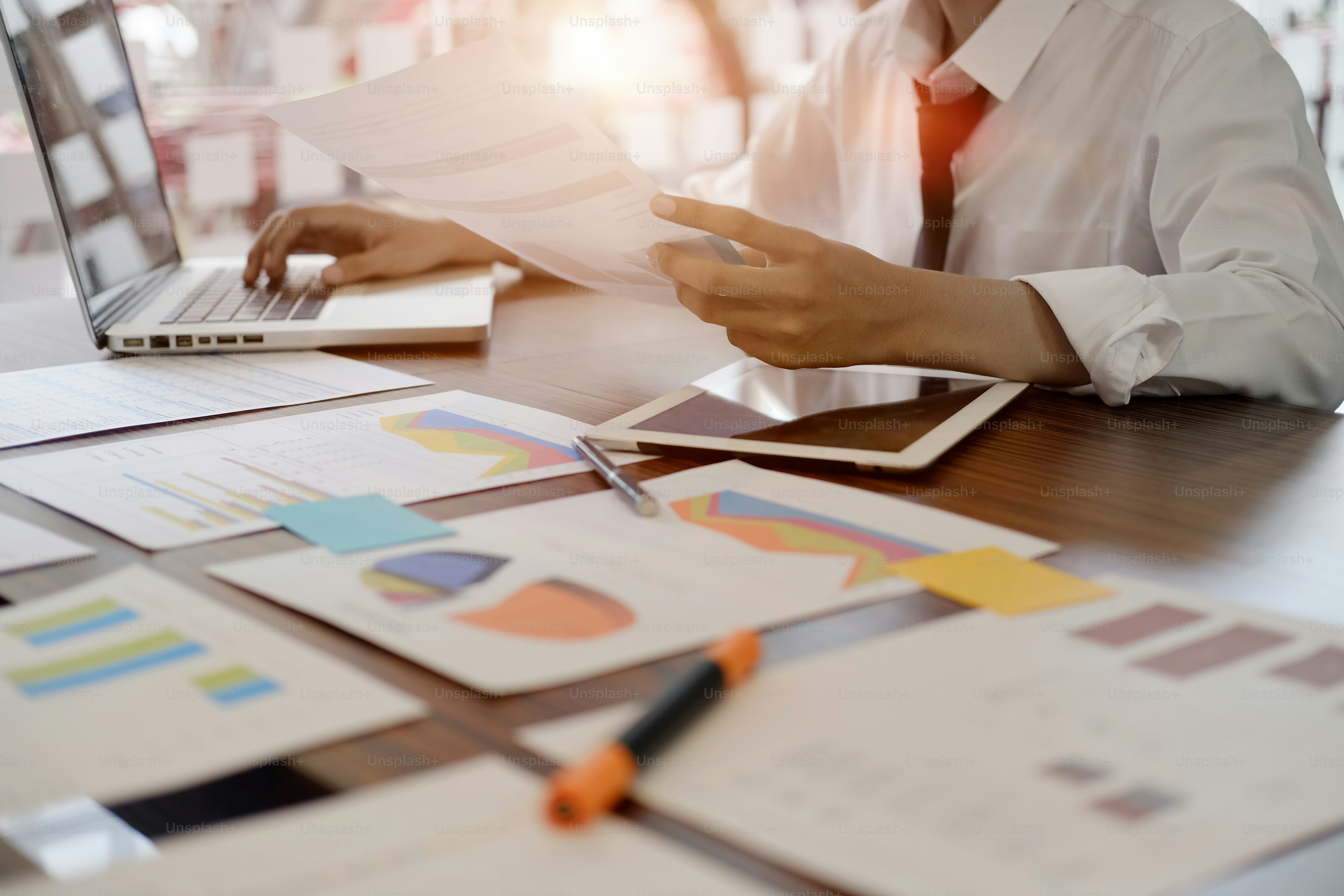 Business analysis hands pointing data paper and consulting with closeup ...