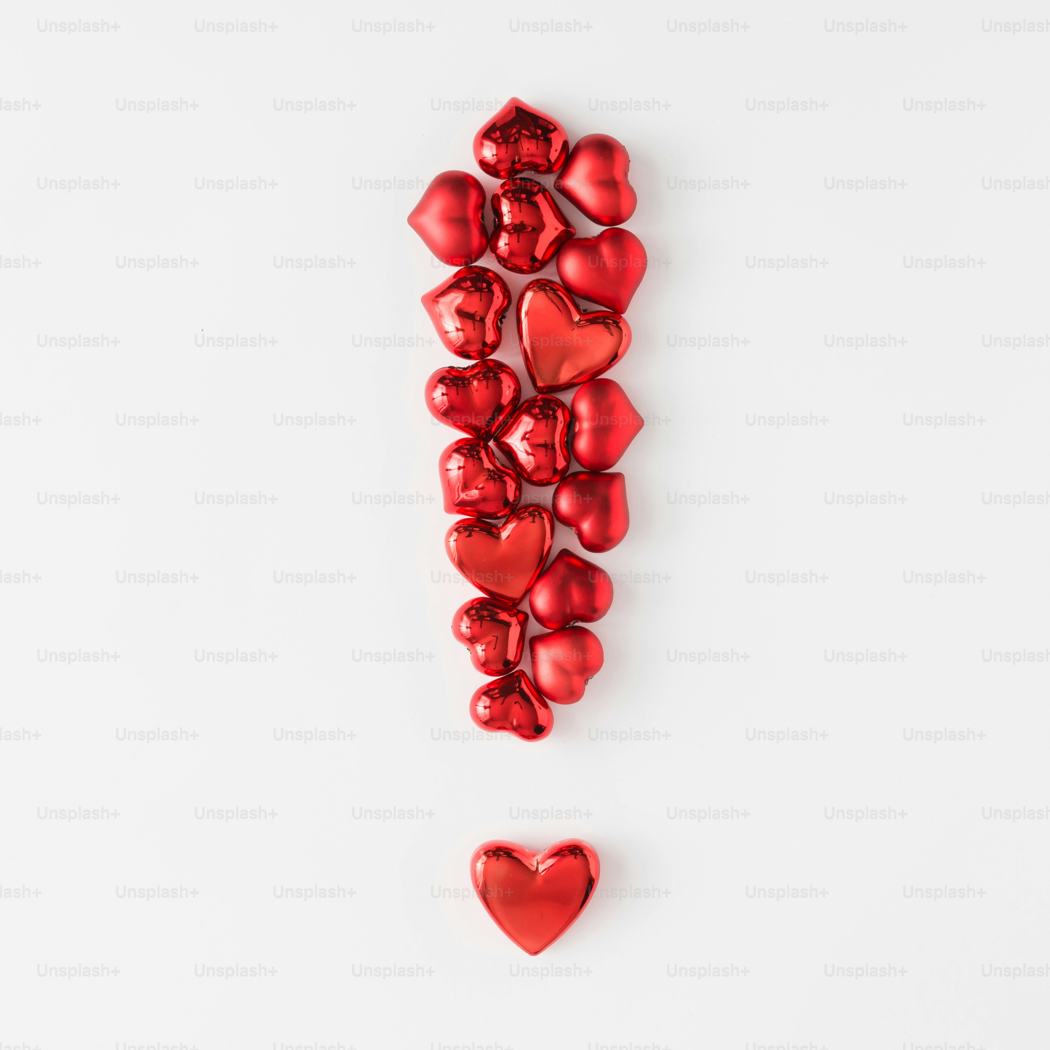 Exclamation mark made of red hearts. Flat lay. Minimal love concept ...