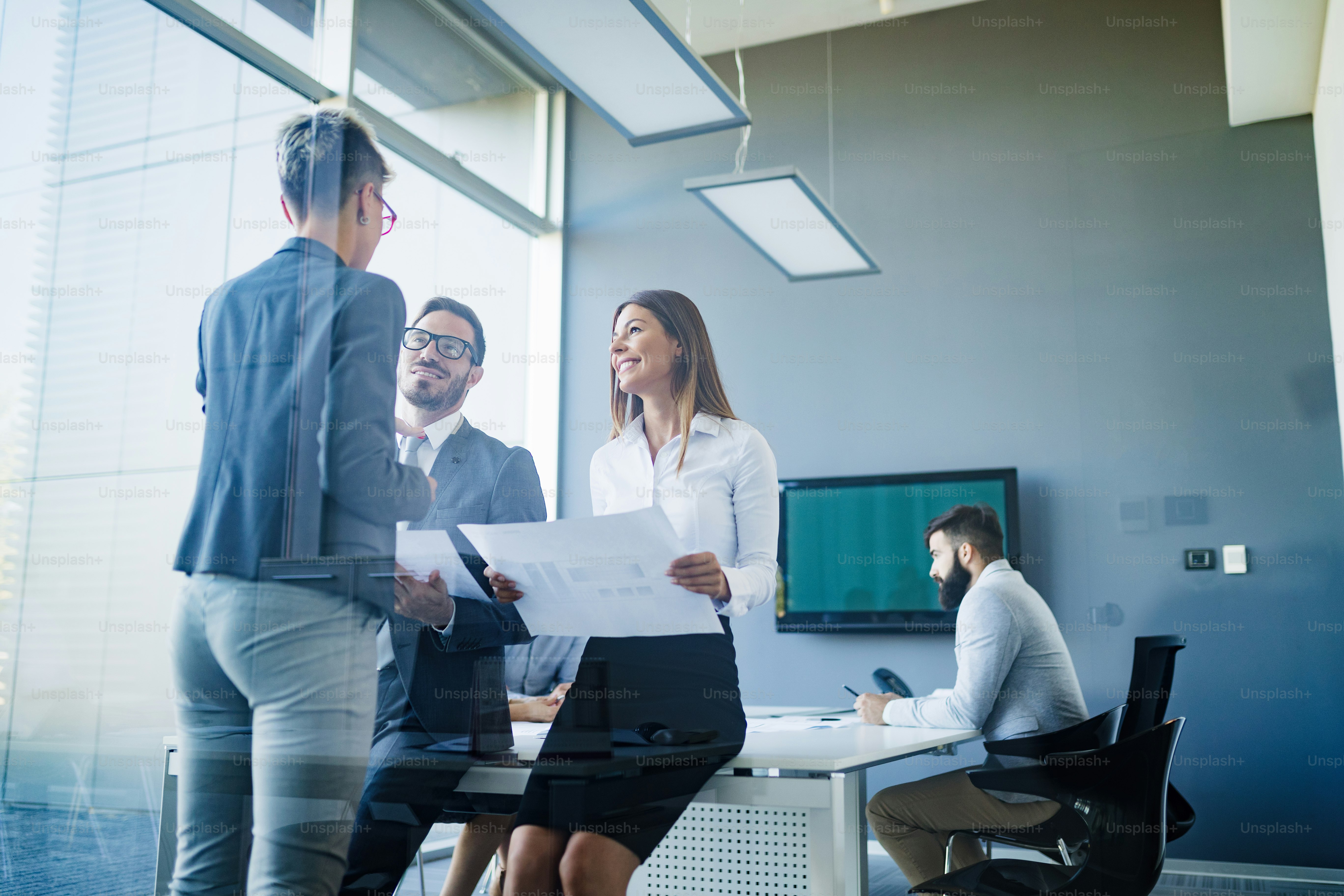 Group of architects and business people working together and ...