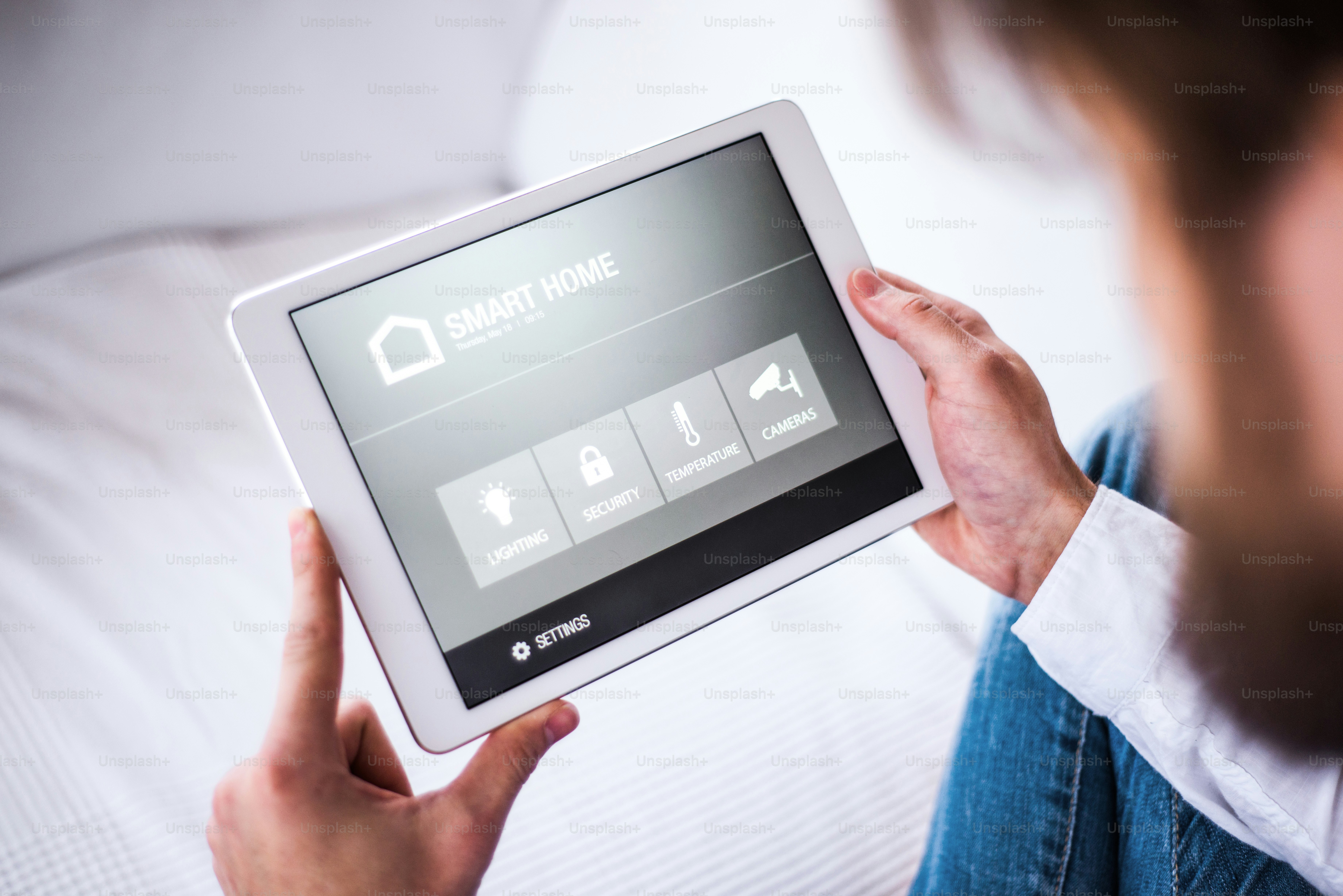 A tablet with smart home control system.A tablet with smart home ...