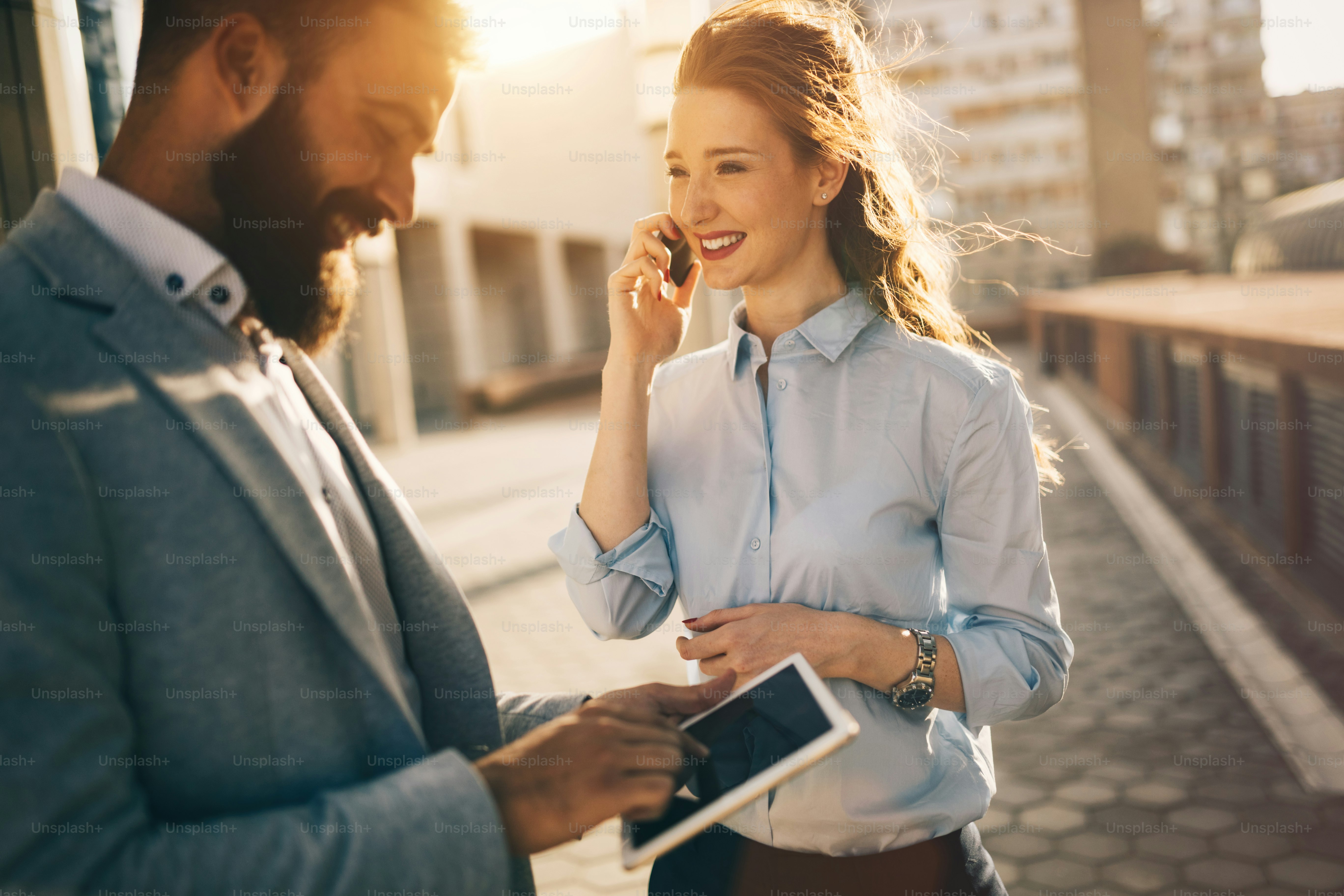 Picture of handsome man and beautiful woman as business partners photo ...