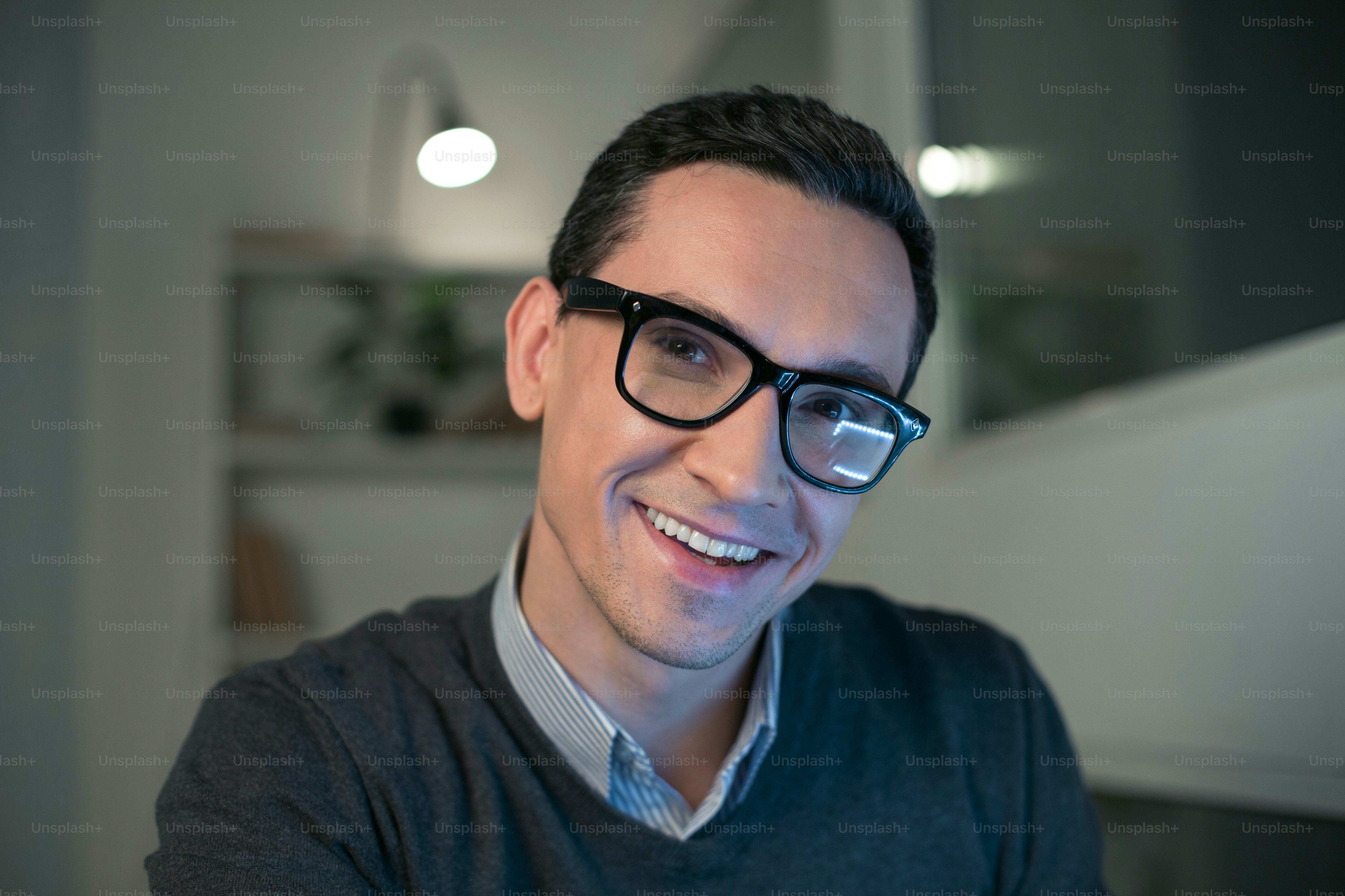 White smile. Cheerful jolly merry man grinning while staring at the ...