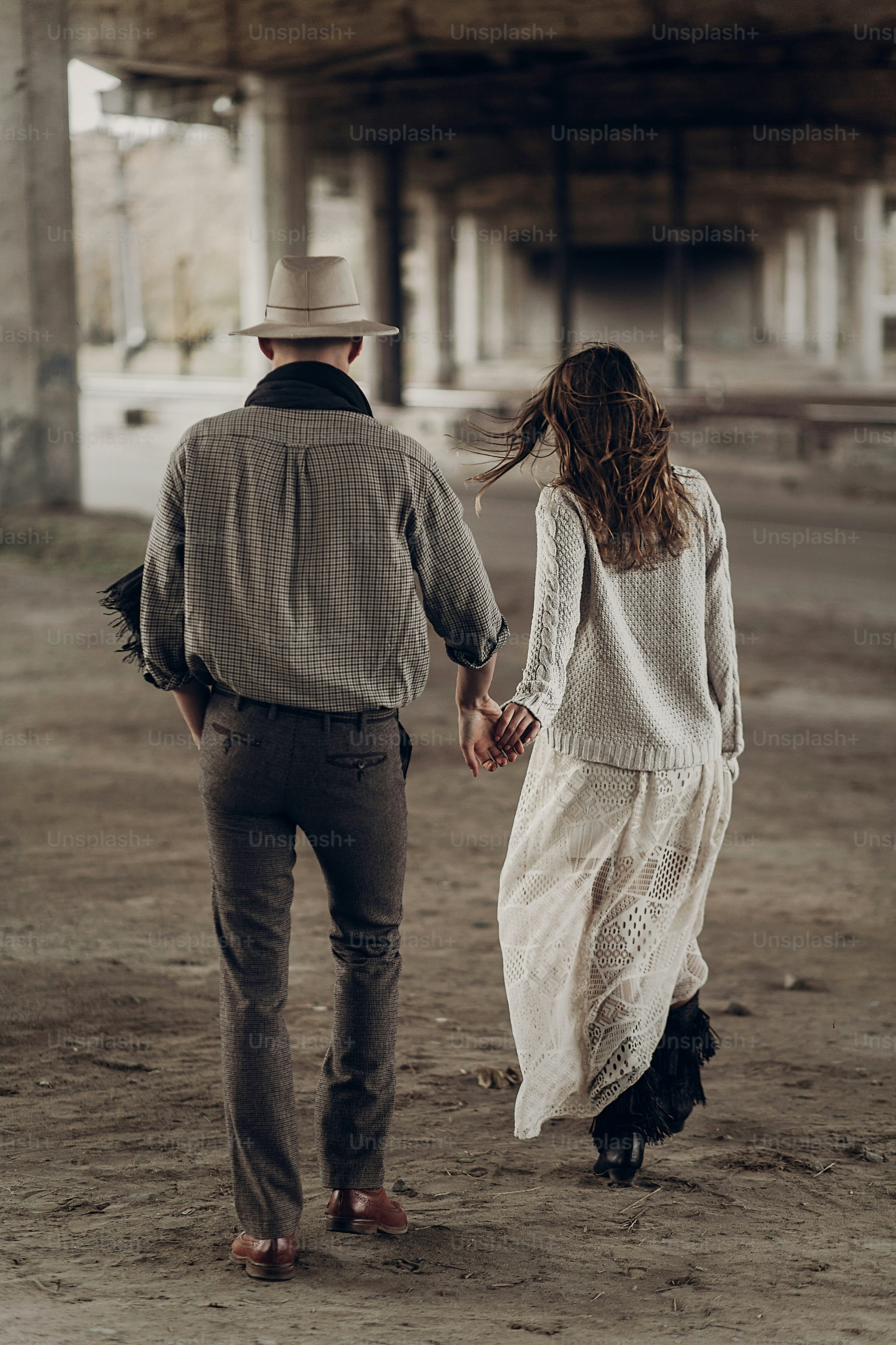 Handsome texas cowboy man in white hat holding hands with beautiful ...