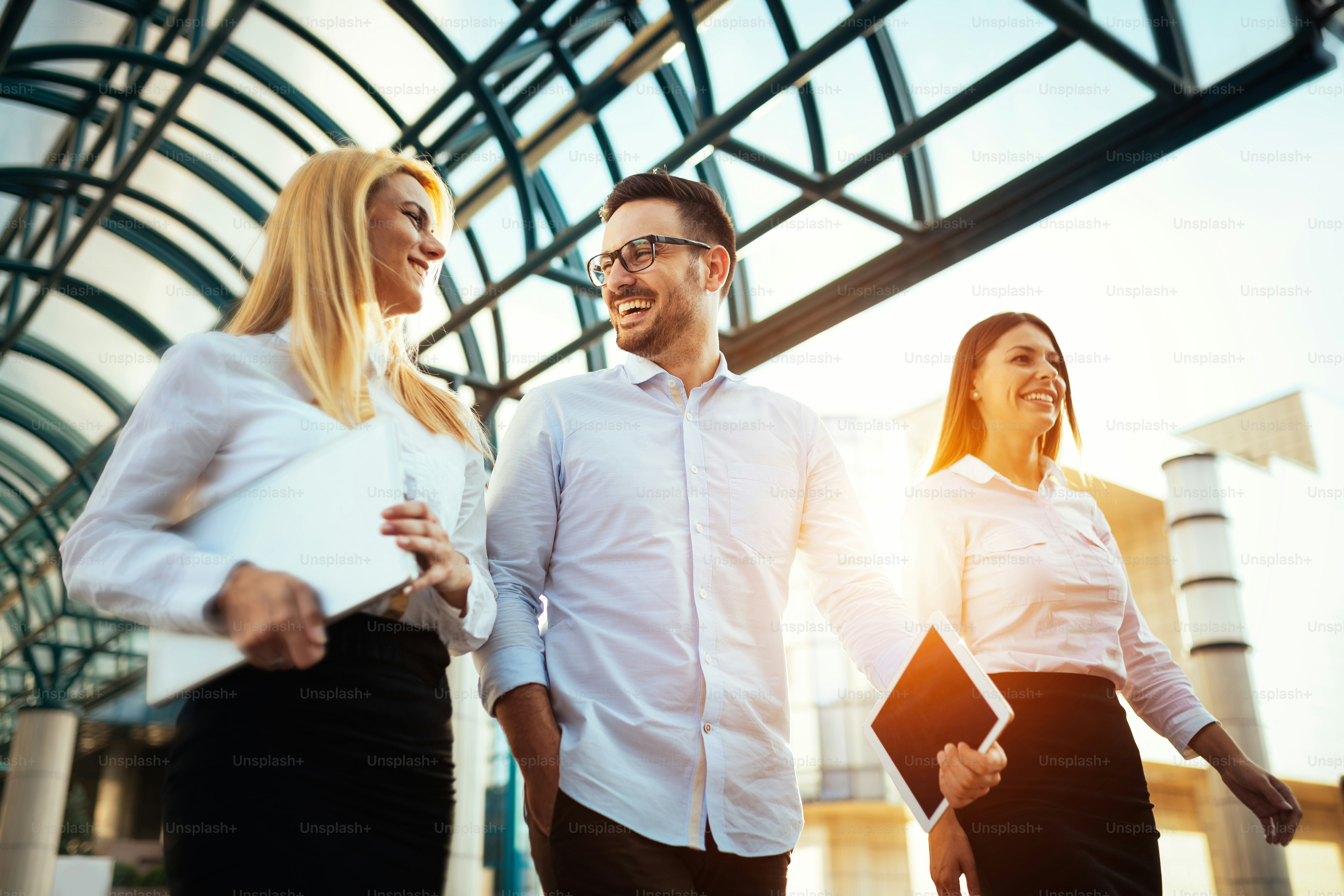 Business people having fun and chatting at workplace office photo ...