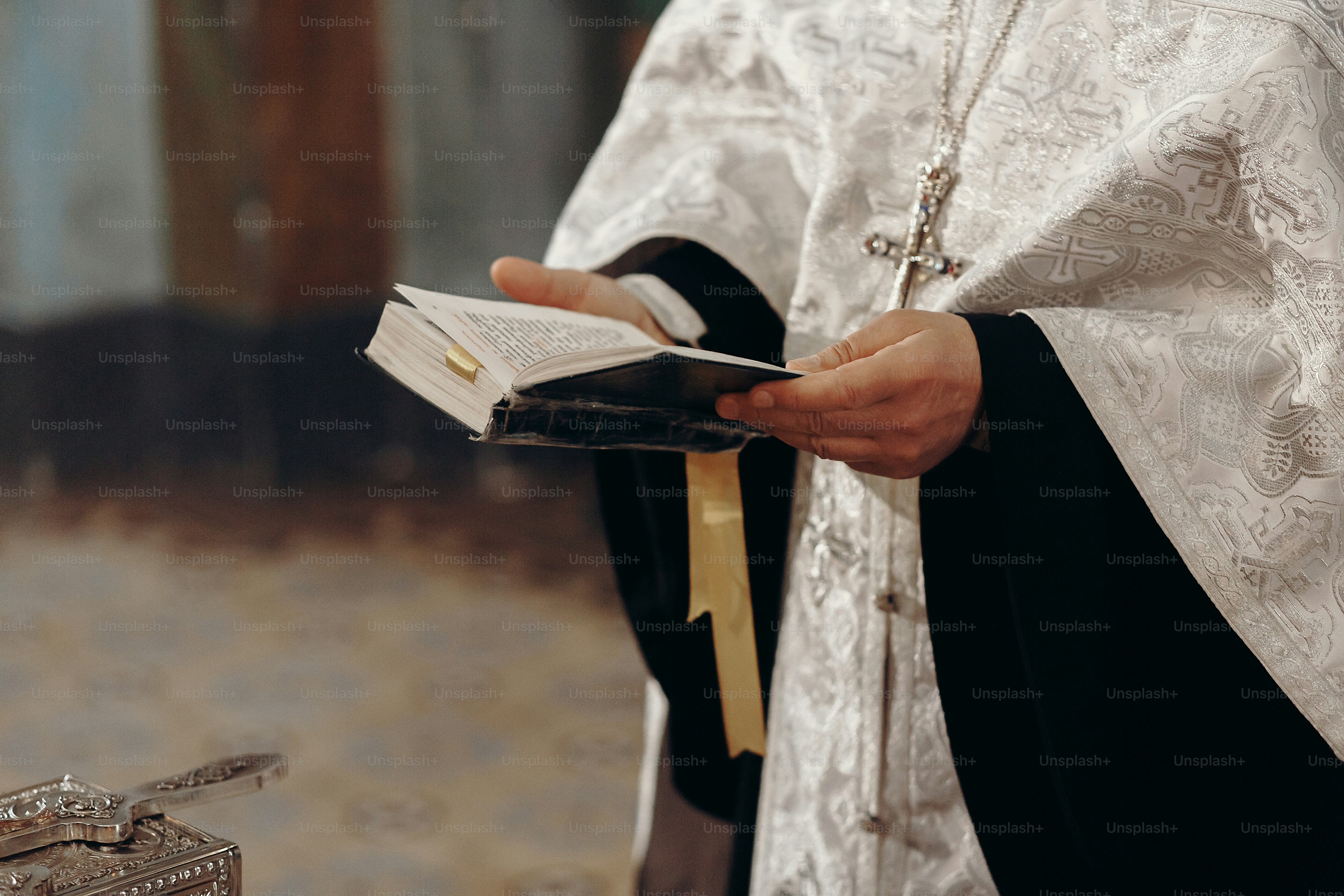 Priest reading holy bible in christian church during orthodox wedding ...