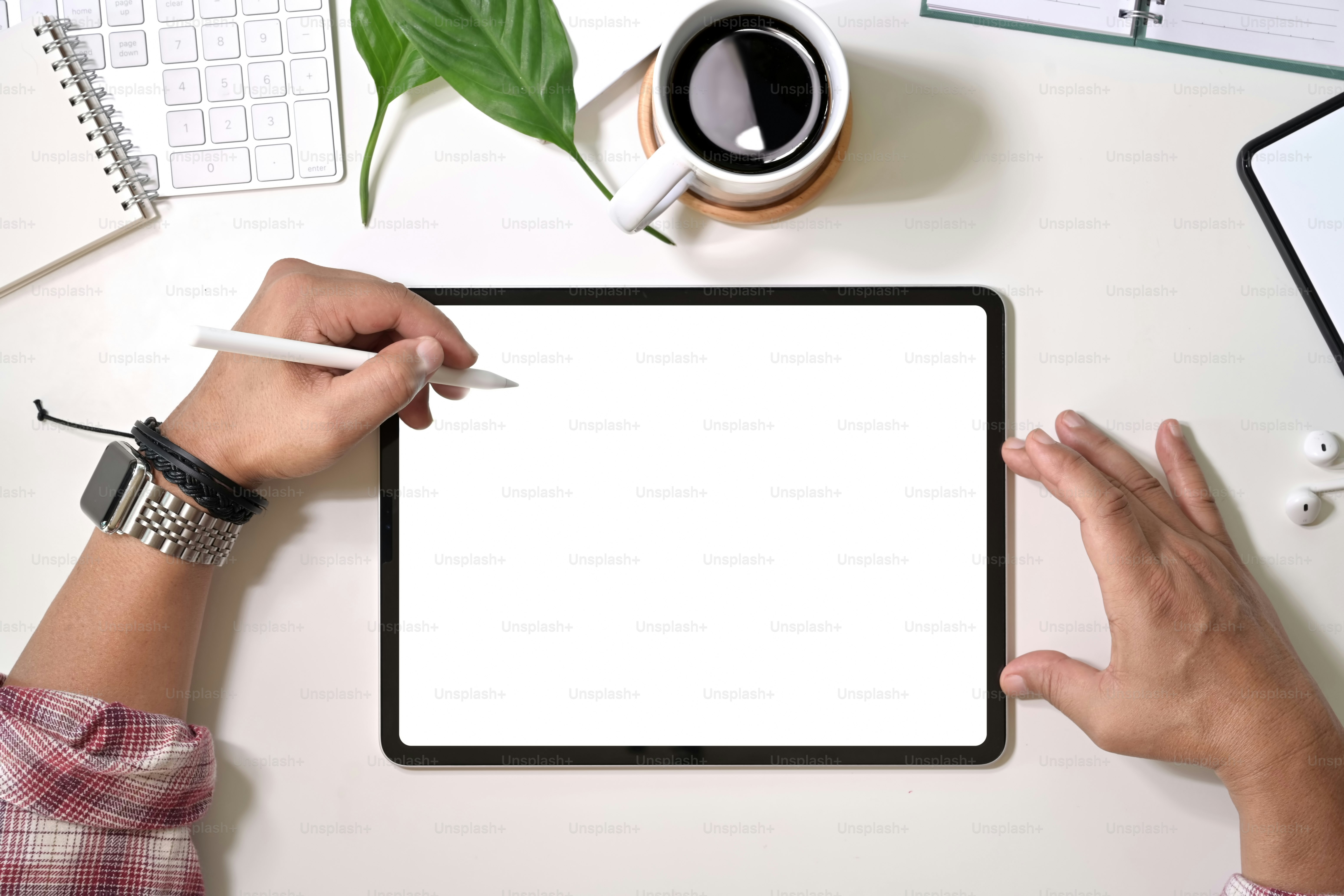 Top view man kind drawing and working with digital display graphics ...