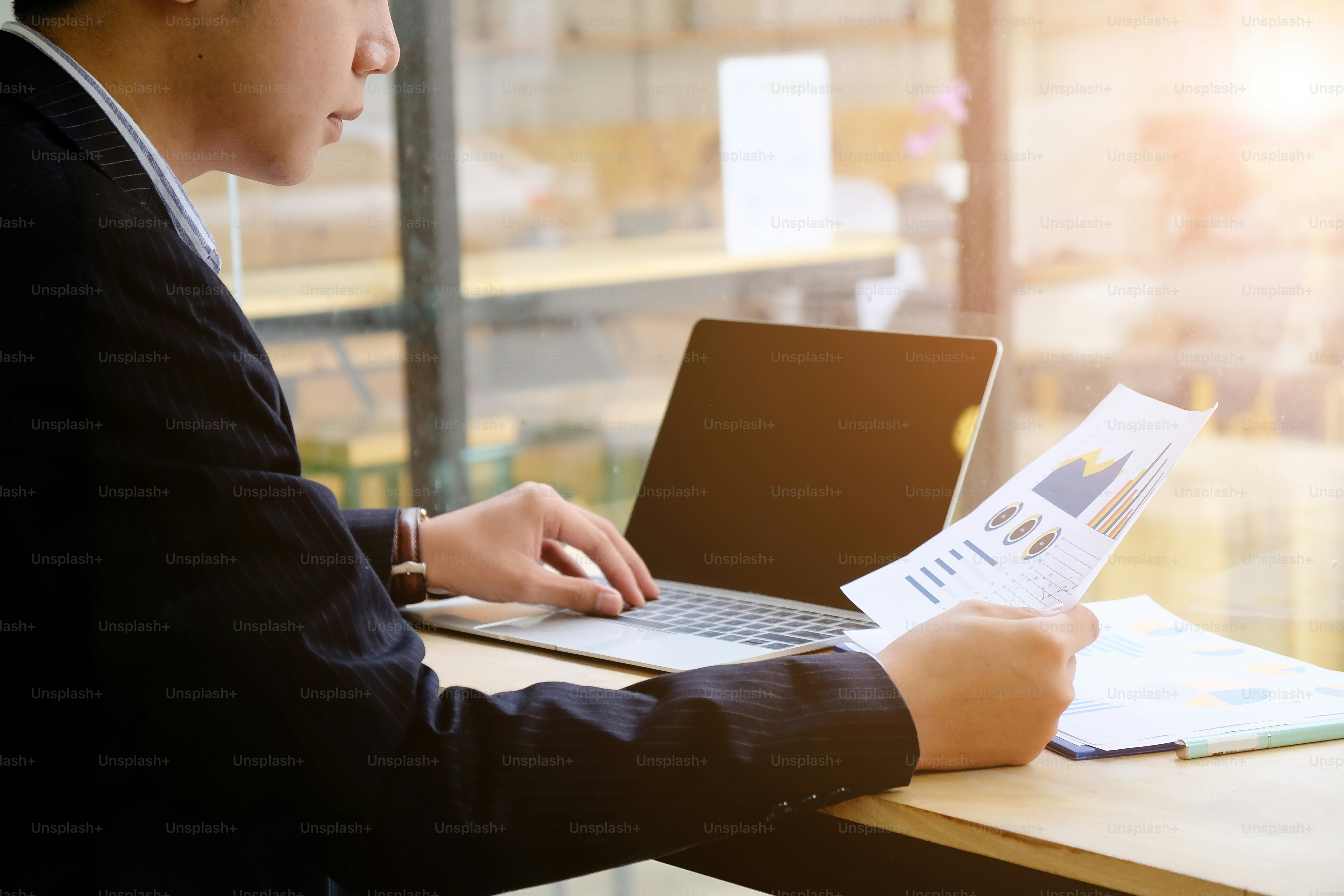 Financial business concept, Businessman research income statement data ...