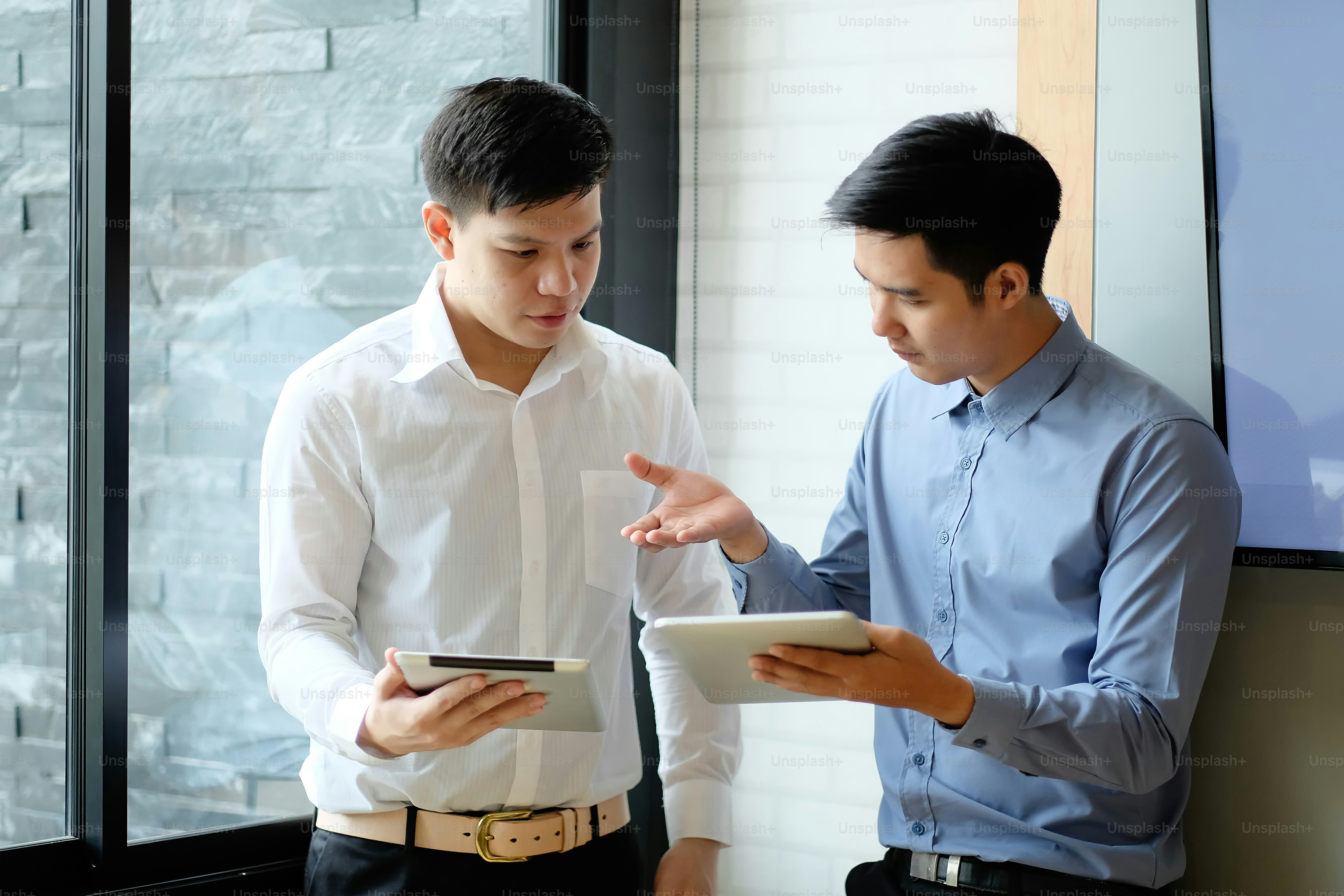 Businessman discuss and consult meeting with digital tablet. photo ...