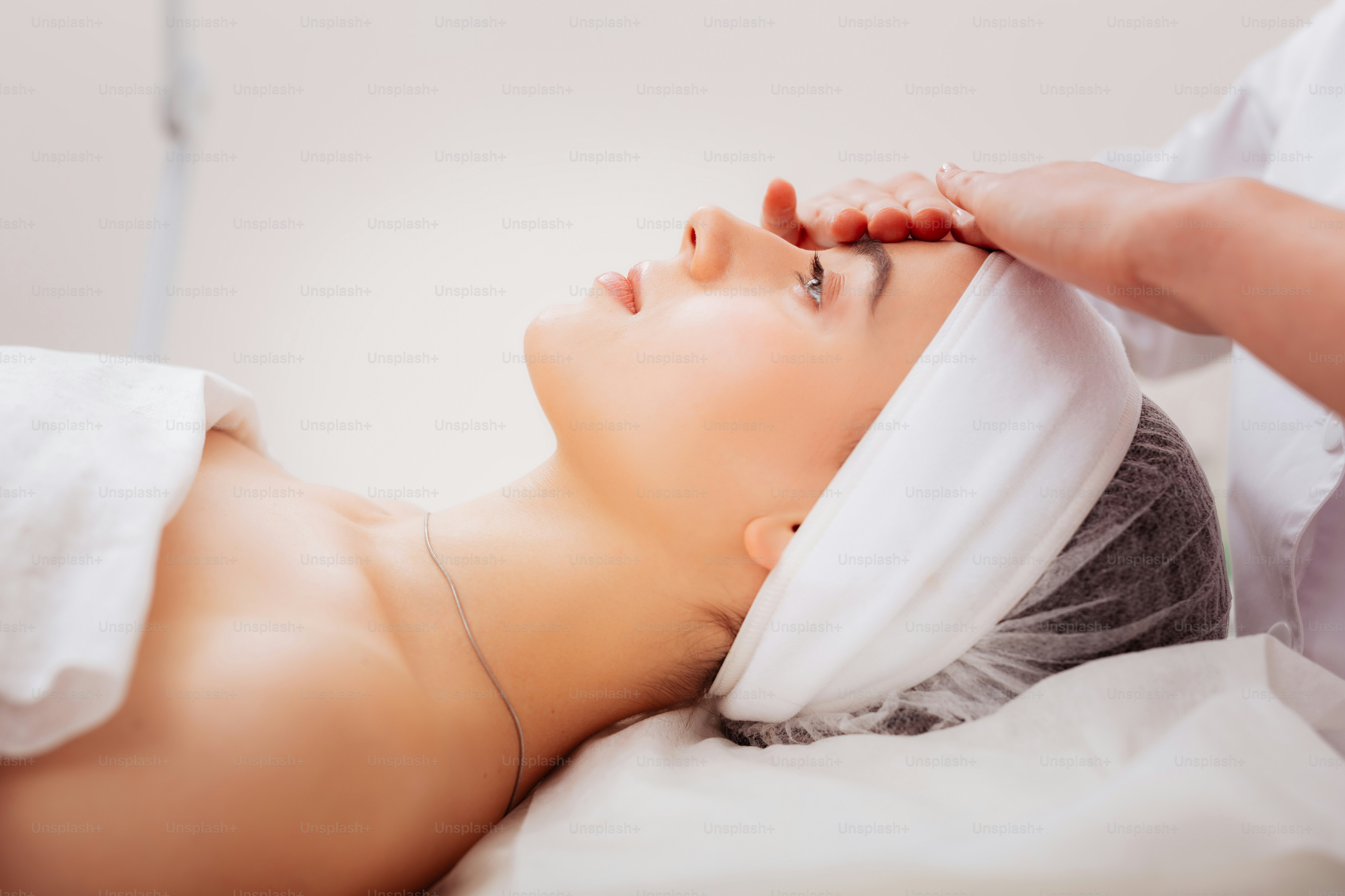 Massage technique. Nice pleasant woman having hands of the massage ...