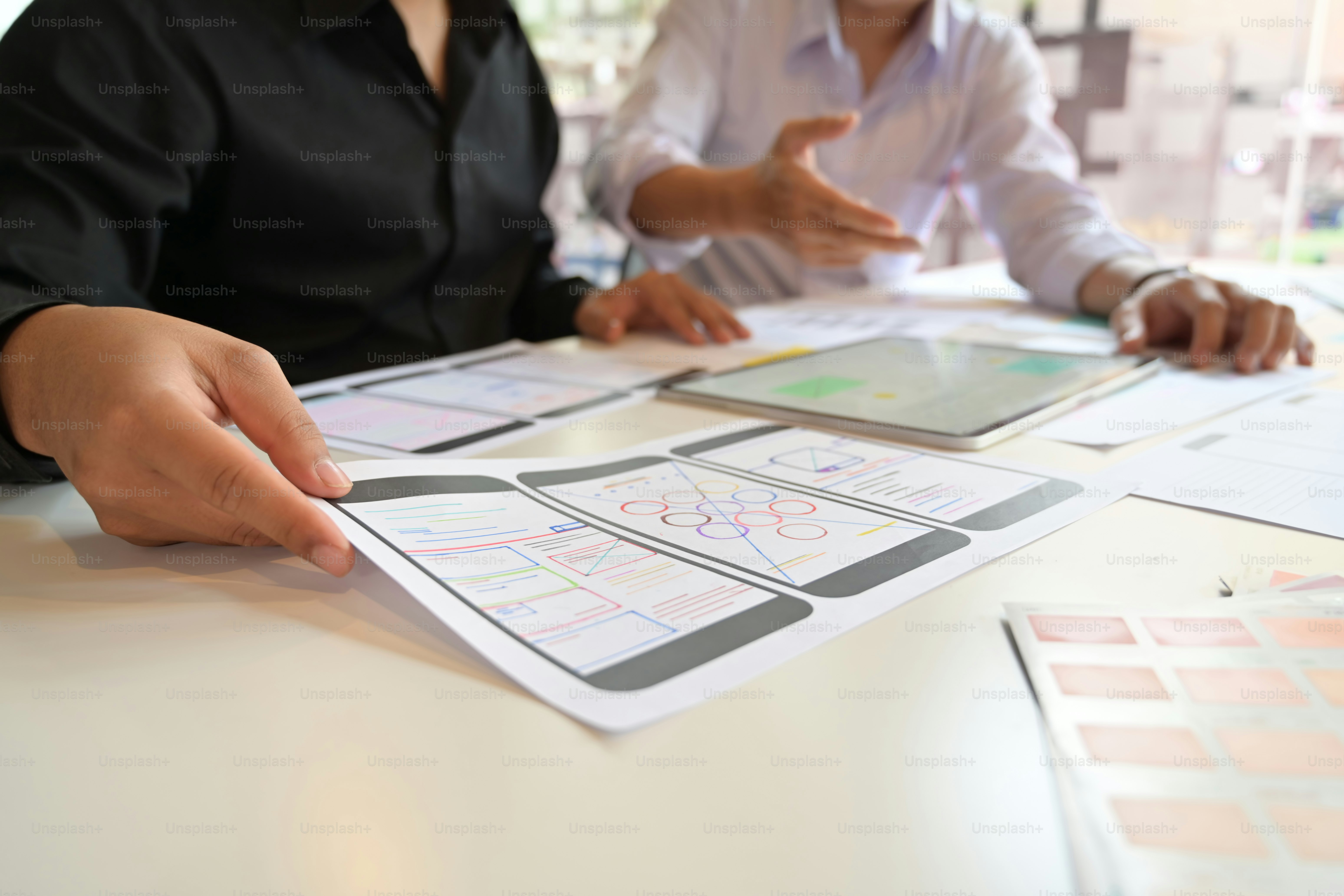 UX designer team using tablet designing wireframe web mobile phone ...