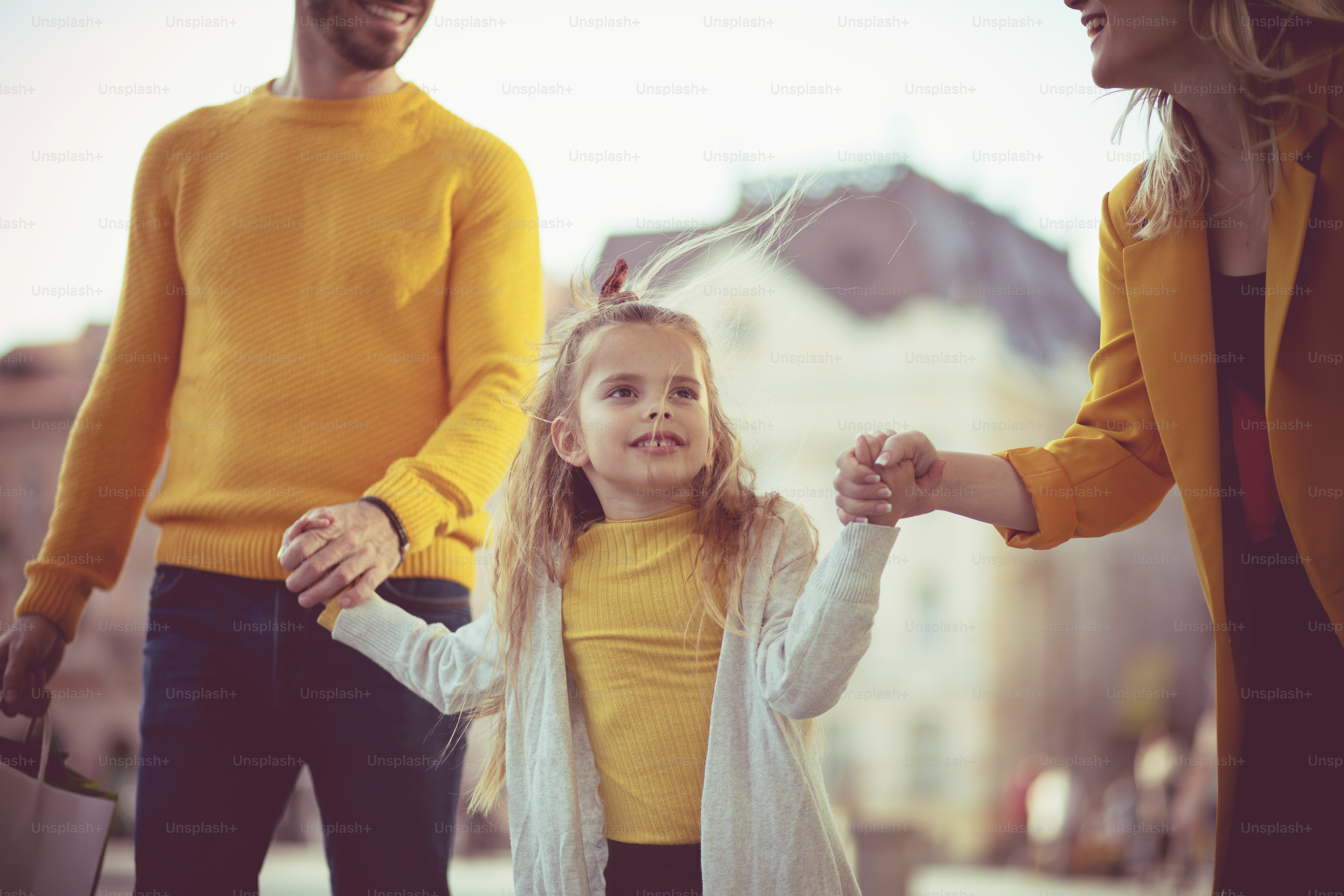 Hypnotized on the dress. Family shopping in the city. photo – Child ...