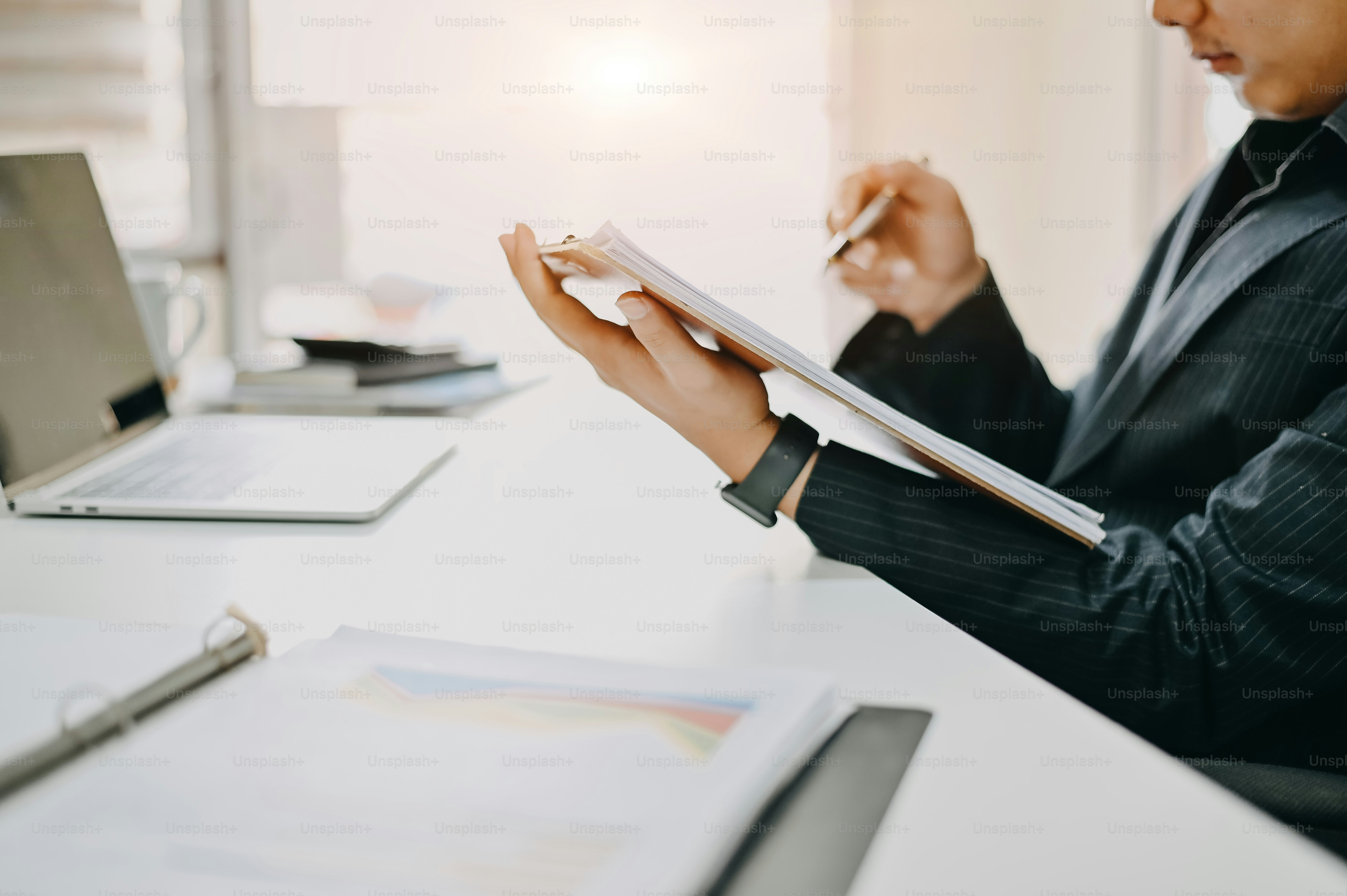 Audit working, Businessman work with paper document on clipping board ...