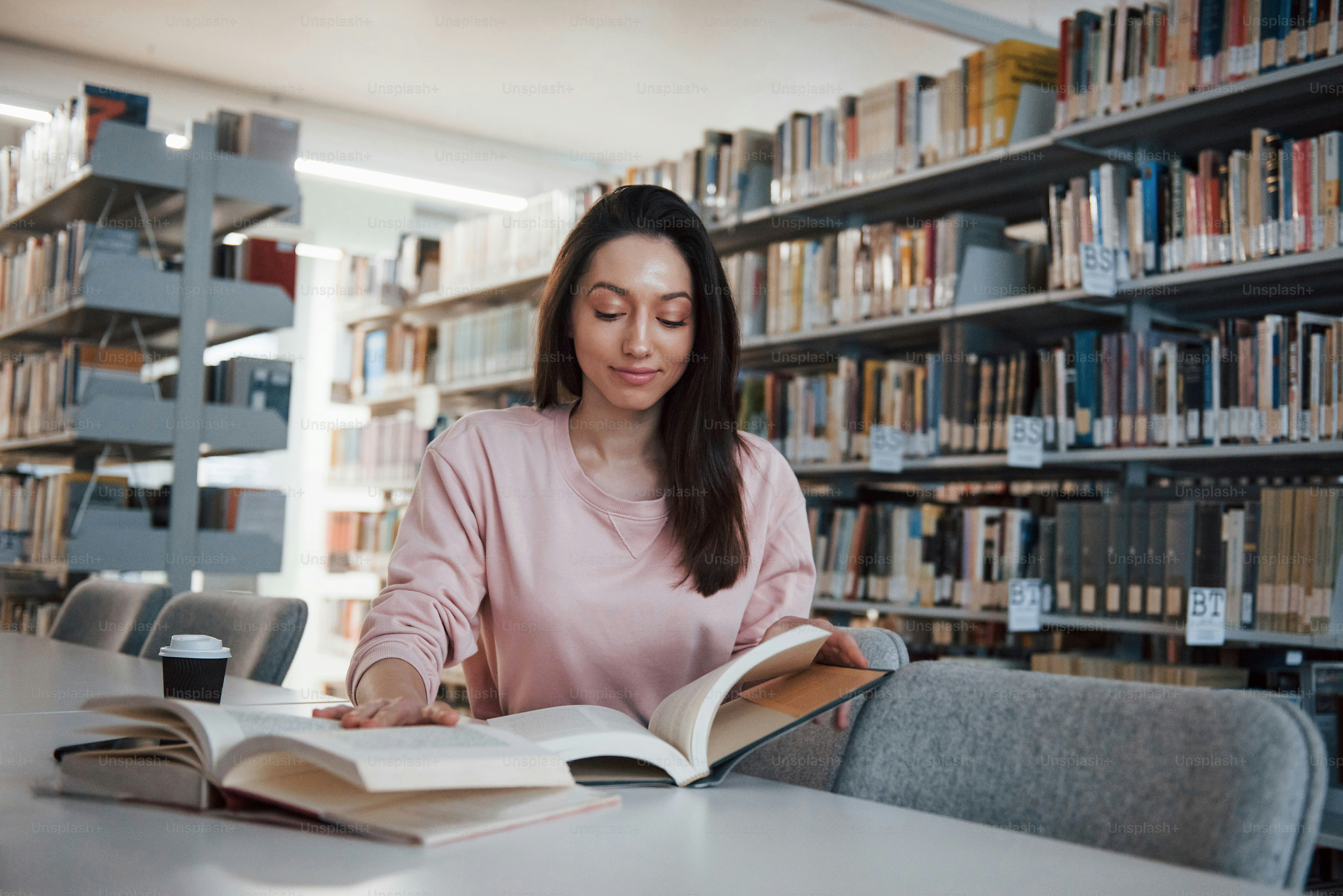 More than enough. Brunette girl in casual clothes having good time in ...