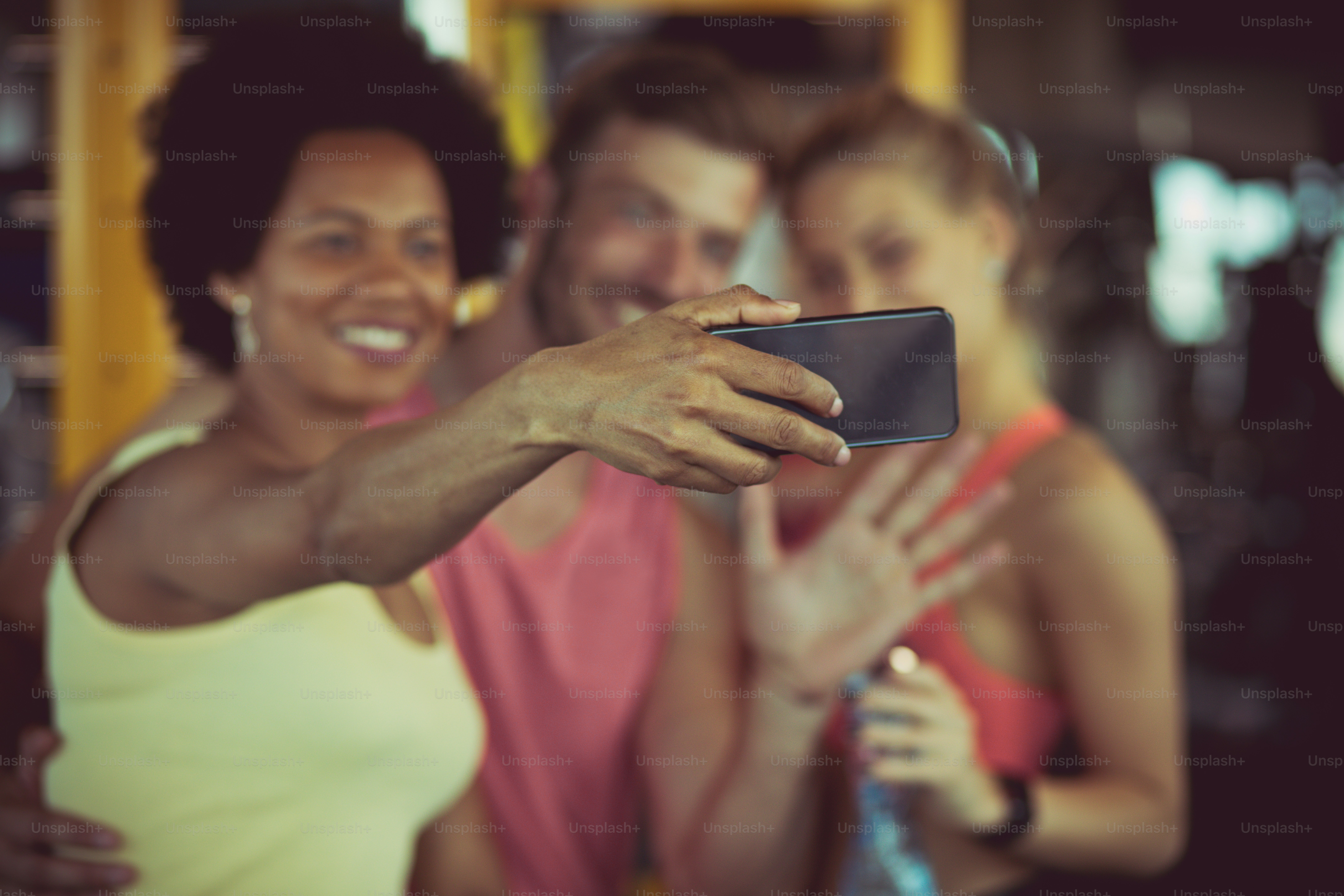 We've got muscles and a great friendship to show off. People at gym ...