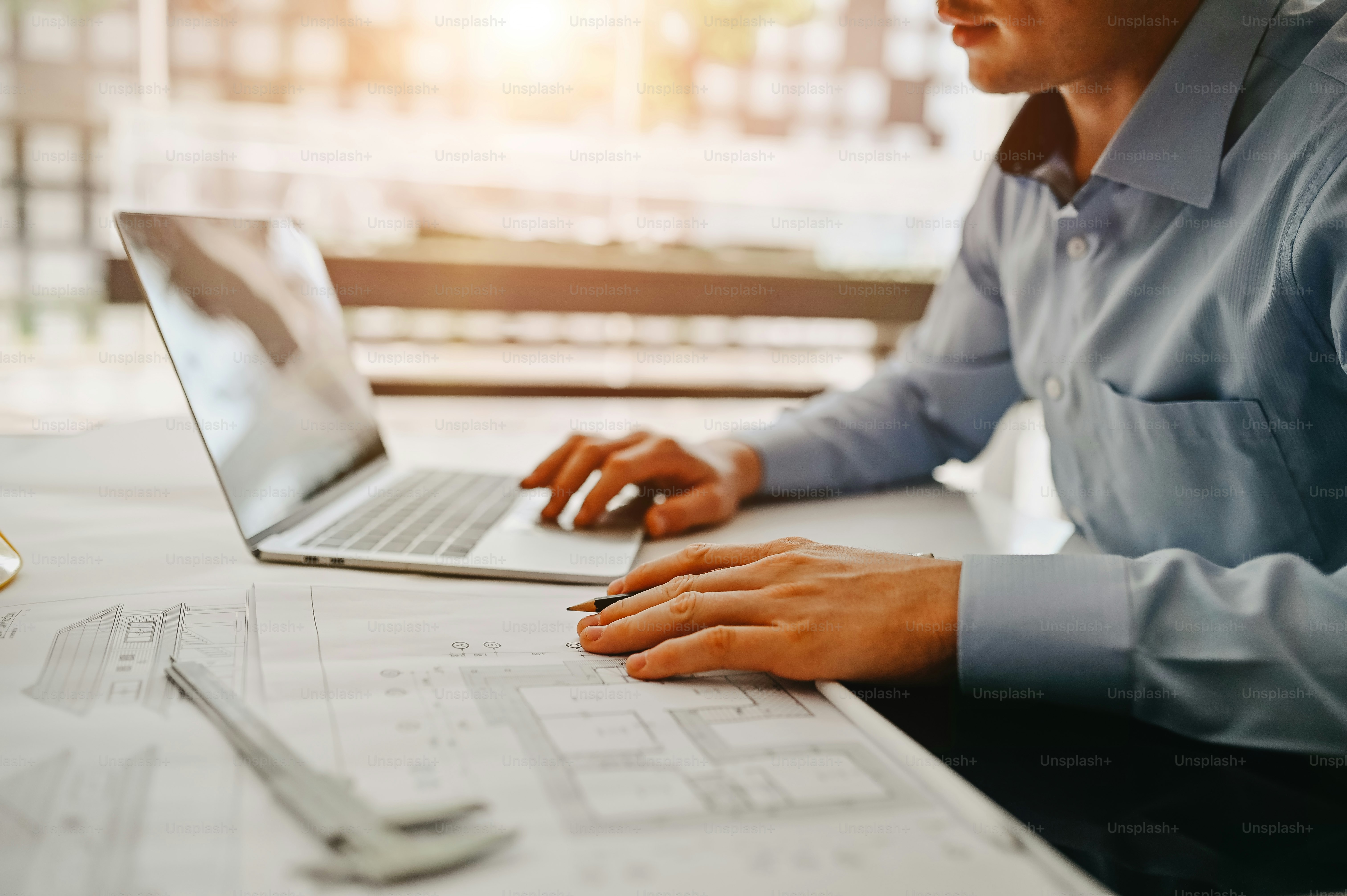 Architect design concept. Young engineer drawing of house structure on ...