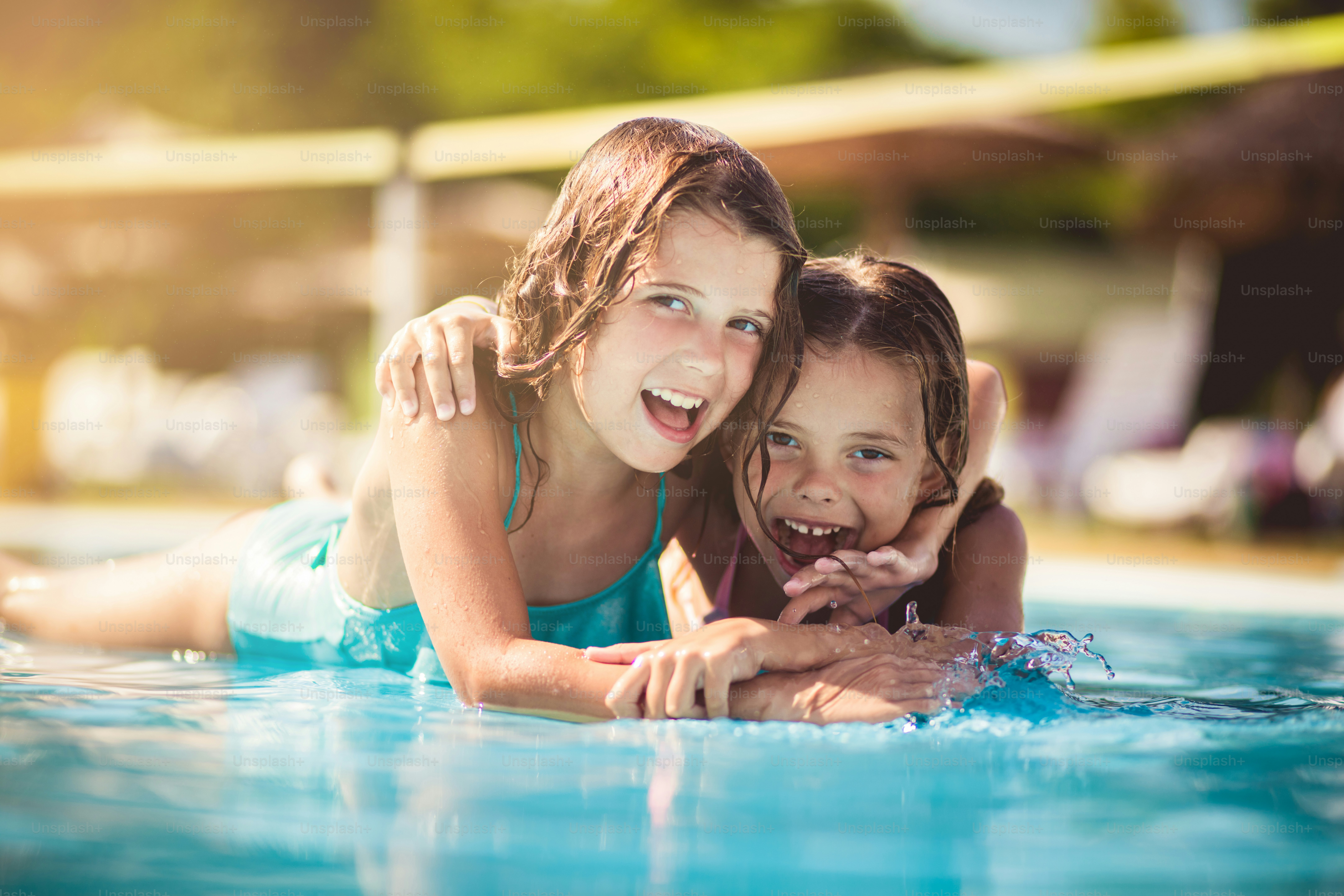 No friends, no fun. Children in pool. photo – Vacations Image on Unsplash