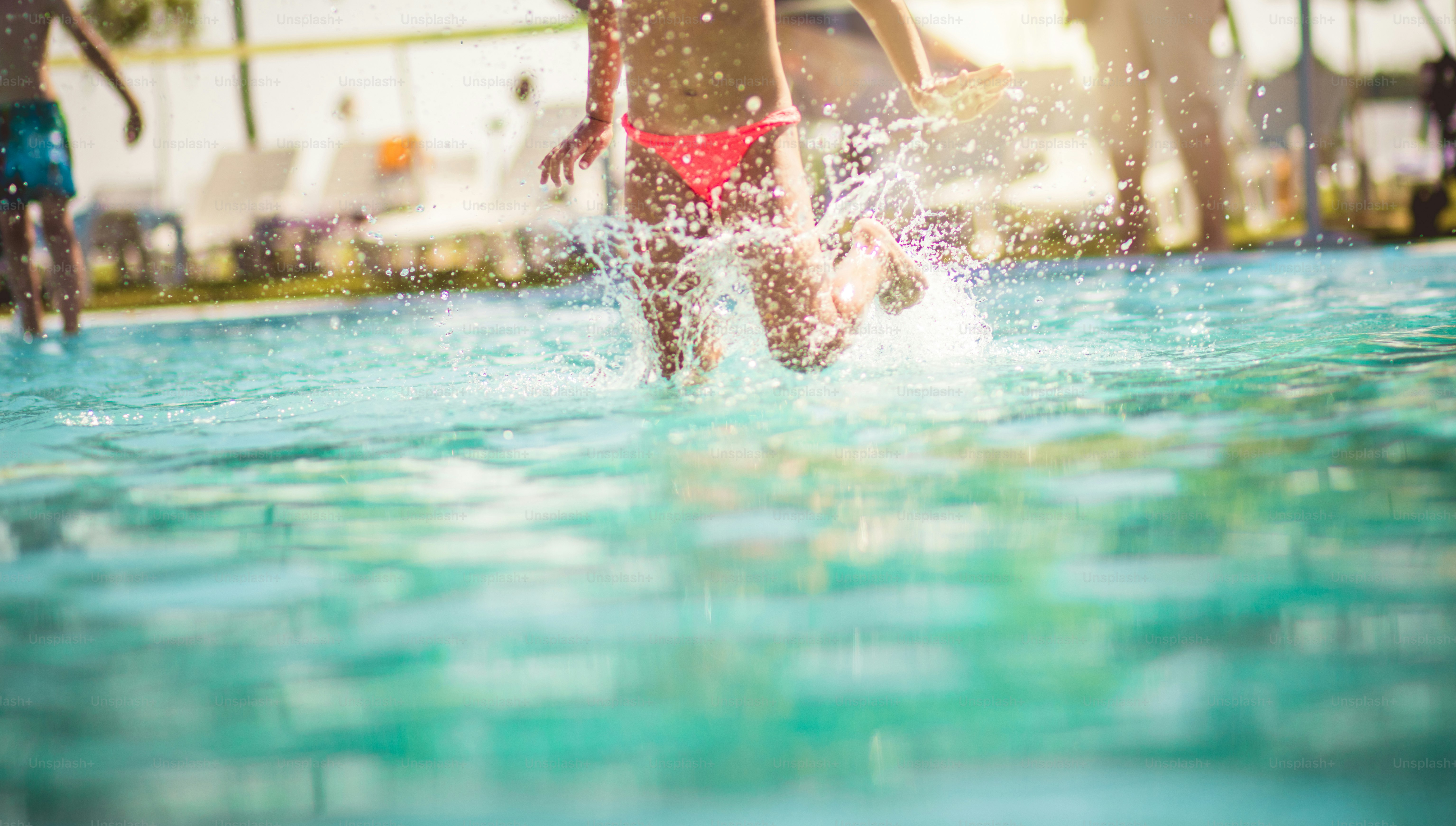 Run is fun in the pool. Child having fun in pool. photo – Water Image ...