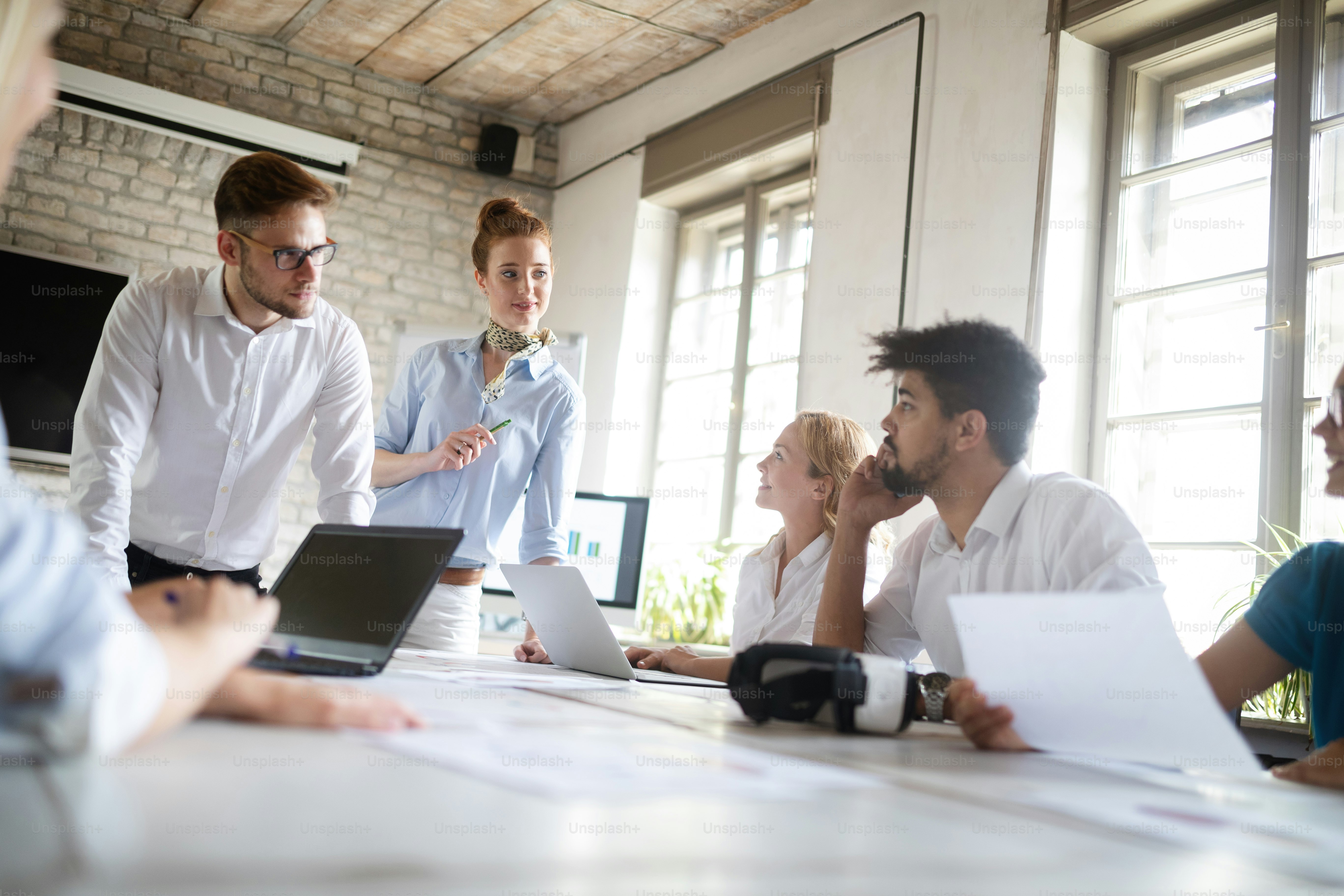 Successful happy group of students learning software engineering and ...