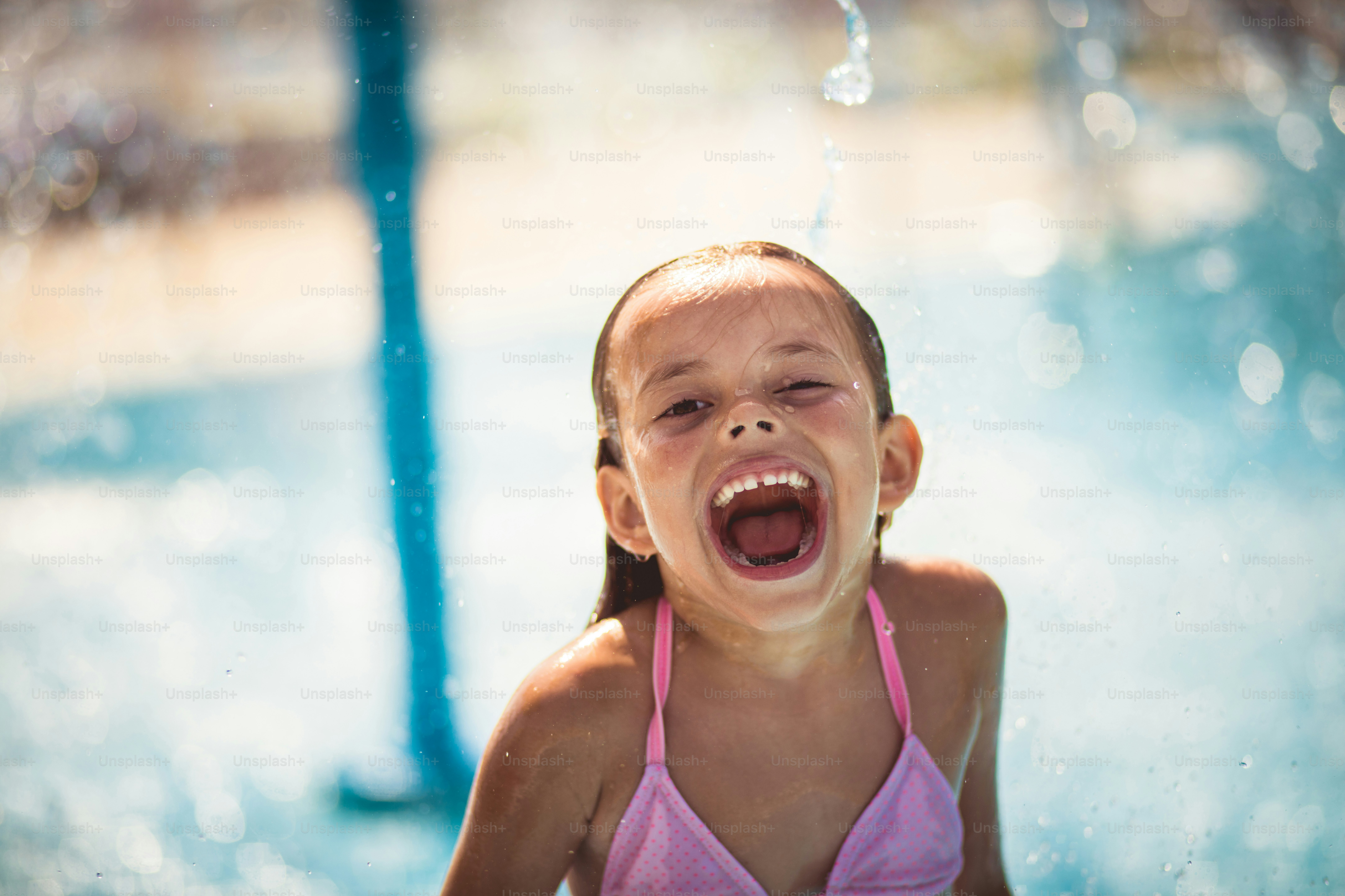Her summer days are full of fun. Child having fun in pool. photo ...
