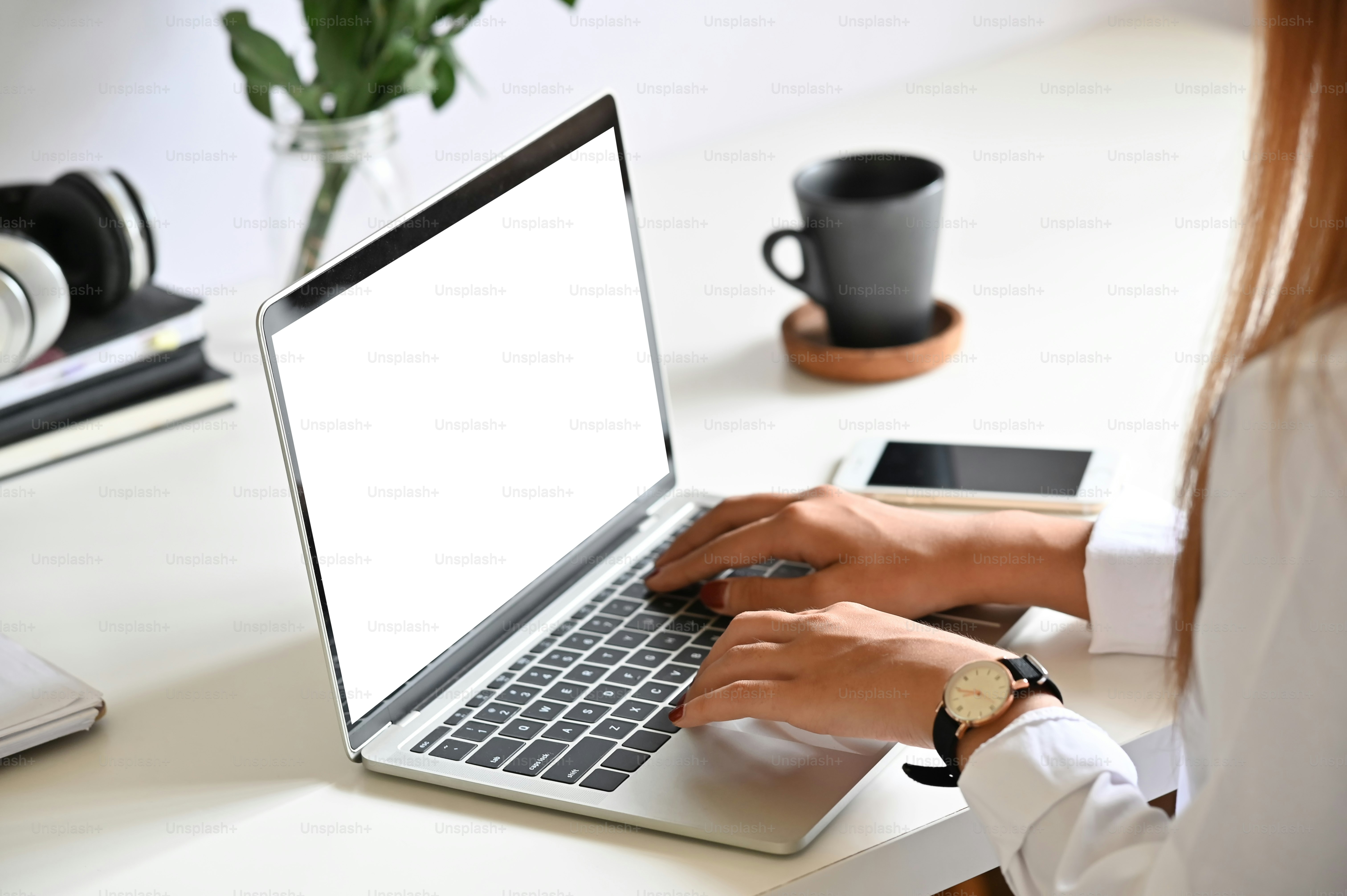 Young woman using mockup laptop computer on table. photo – Thailand ...