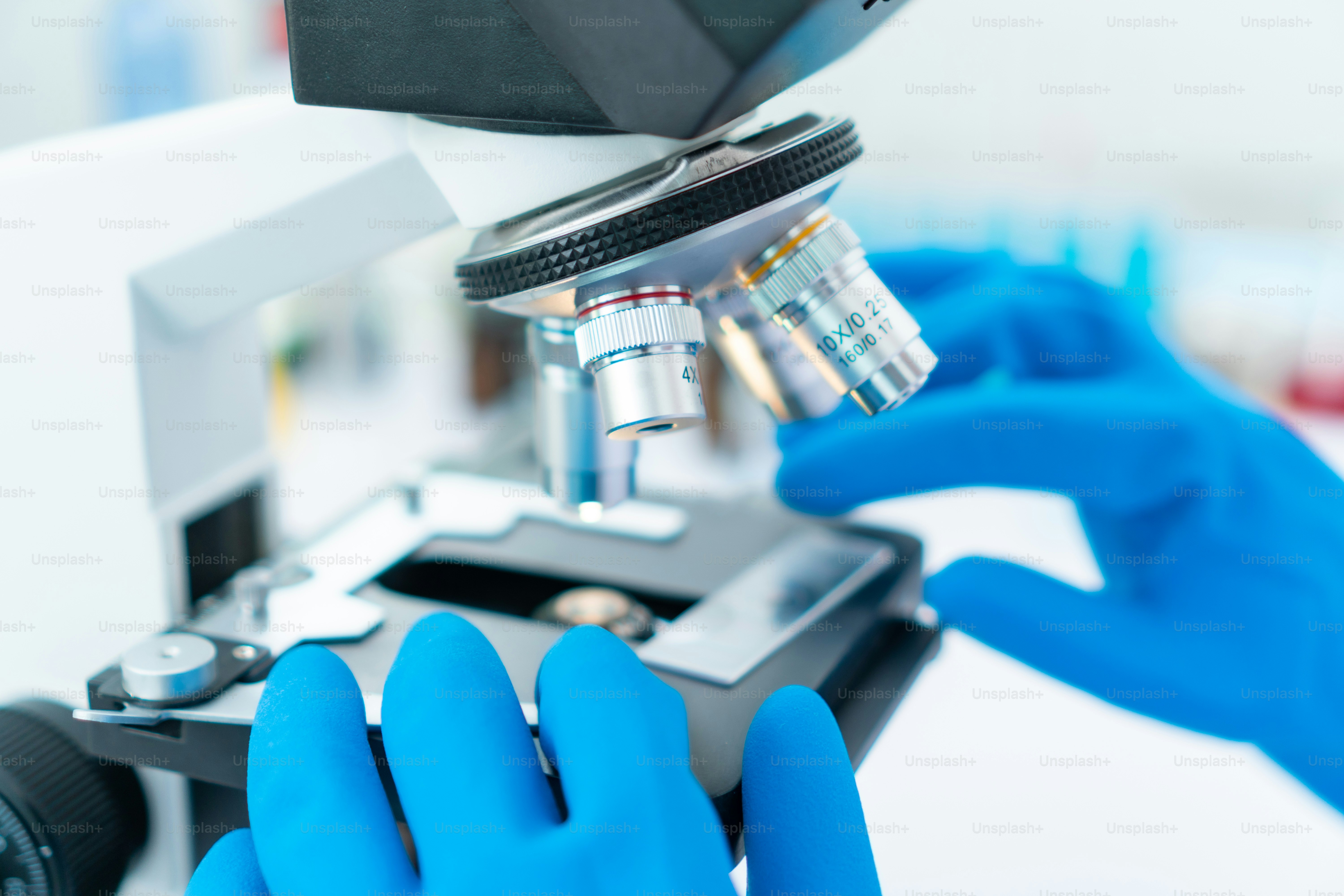 Close-up shot of microscope with metal lens at laboratory. photo ...