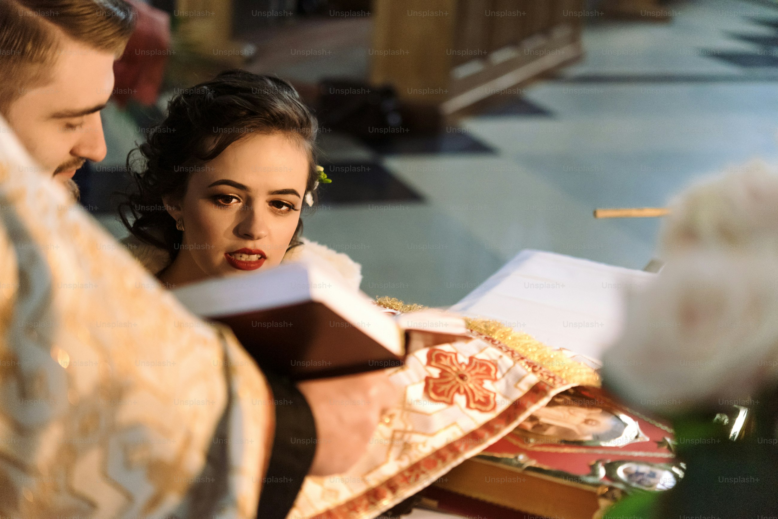 Stylish luxury bride and elegant groom, making oaths, emotional ...