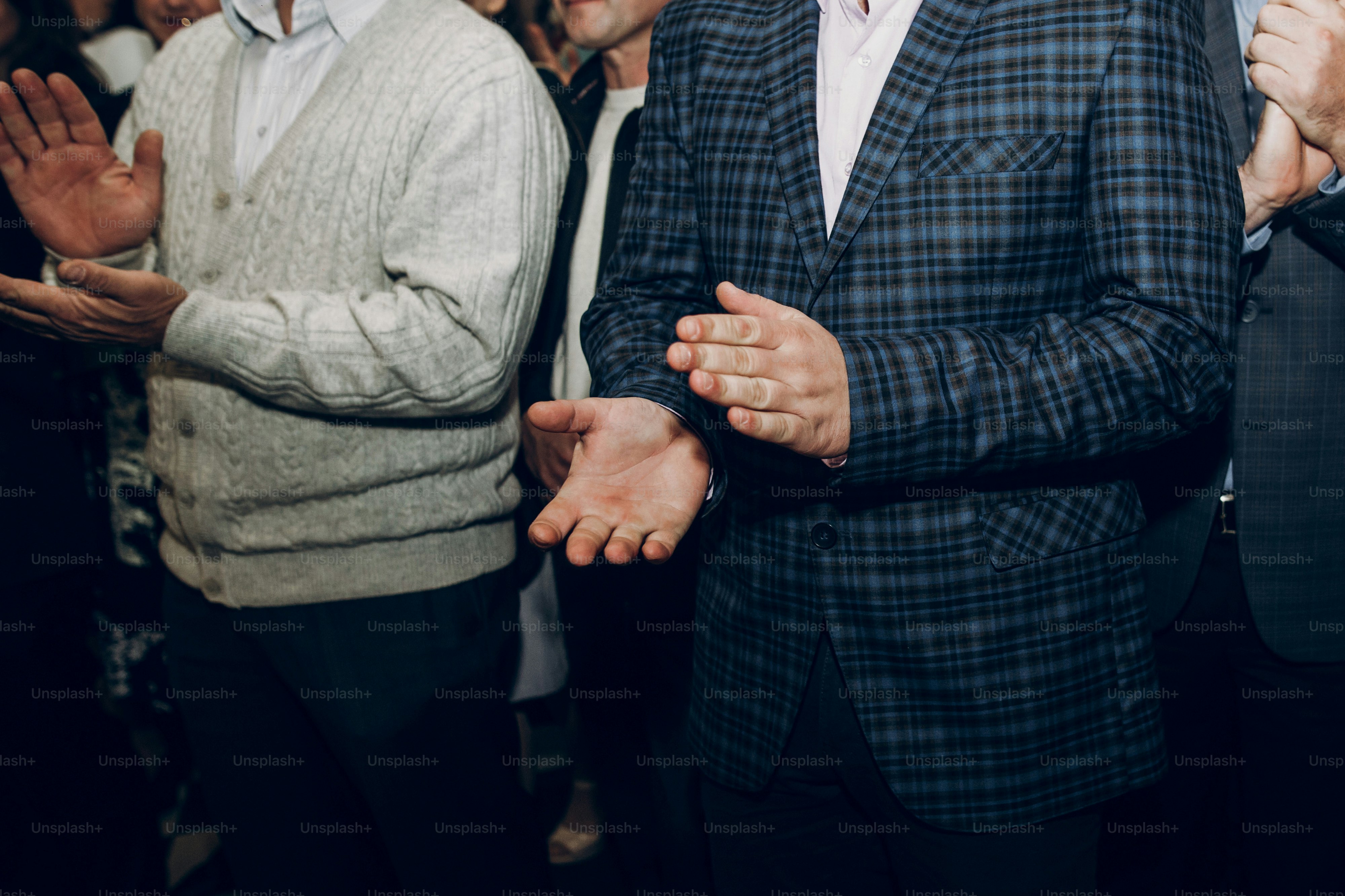 People applauding, clapping hands at wedding reception or meeting photo ...