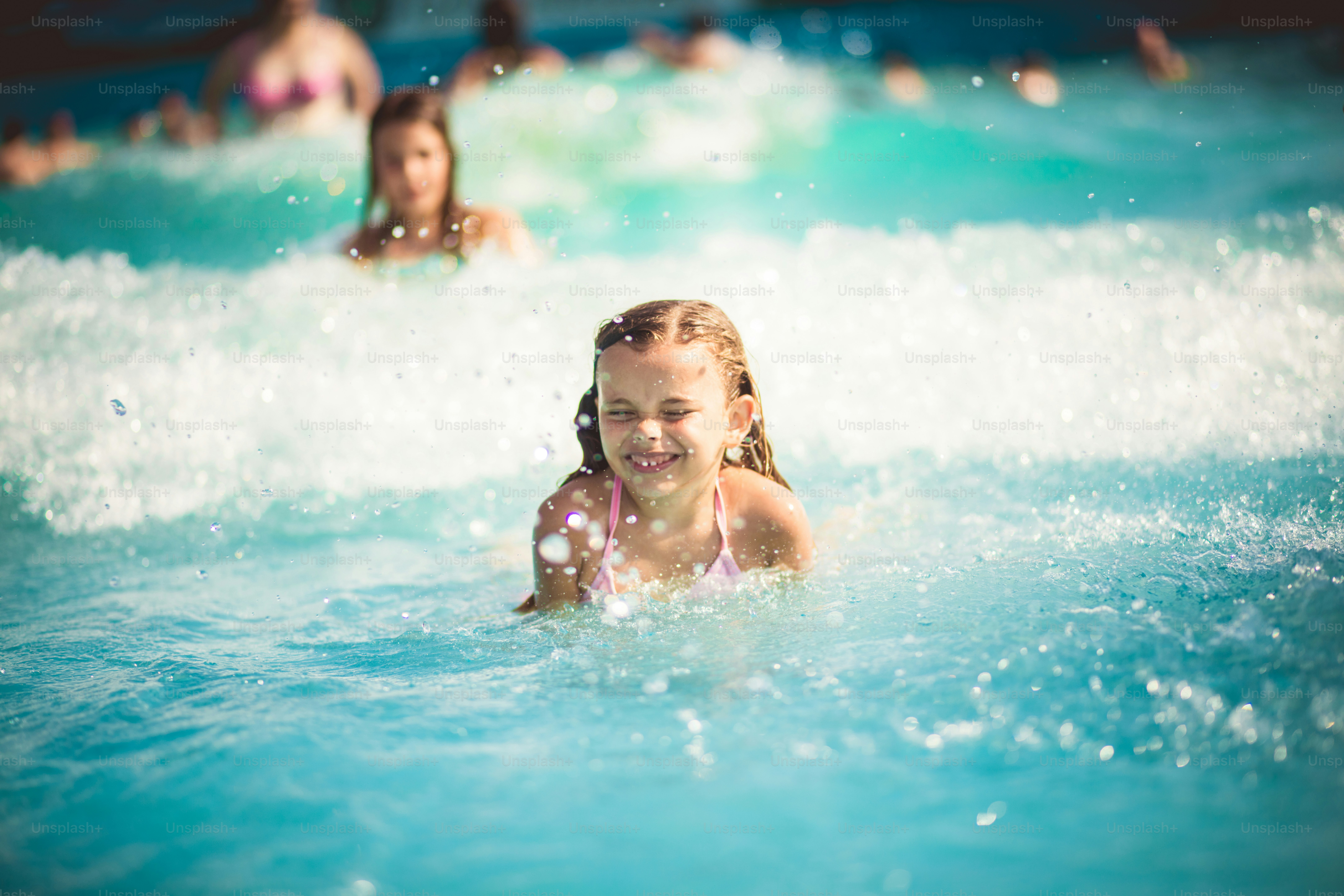 Just swim. Little girl swimming in the pool. photo – Water park Image ...