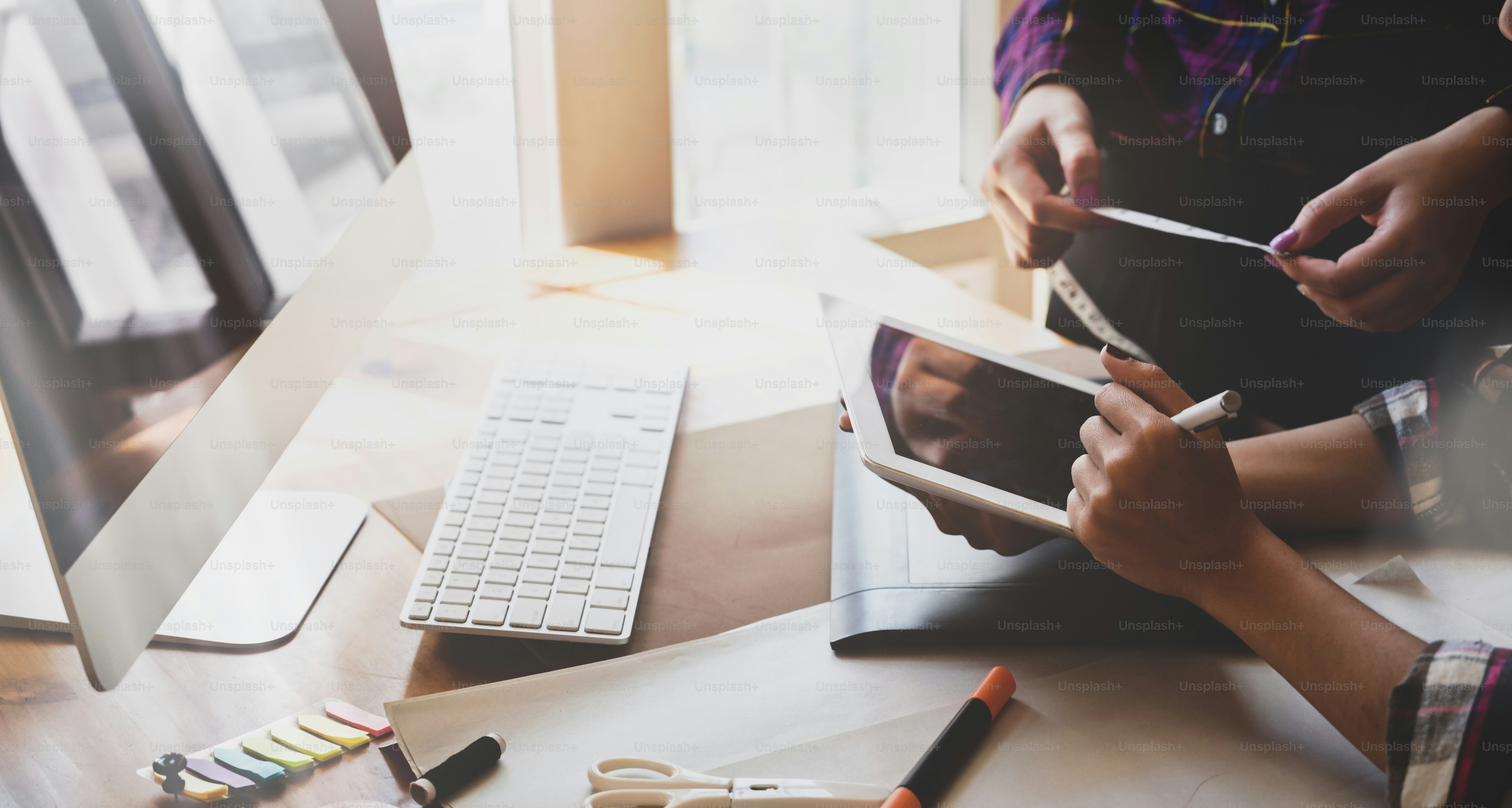 Young professional freelancer's team working on new project together in ...