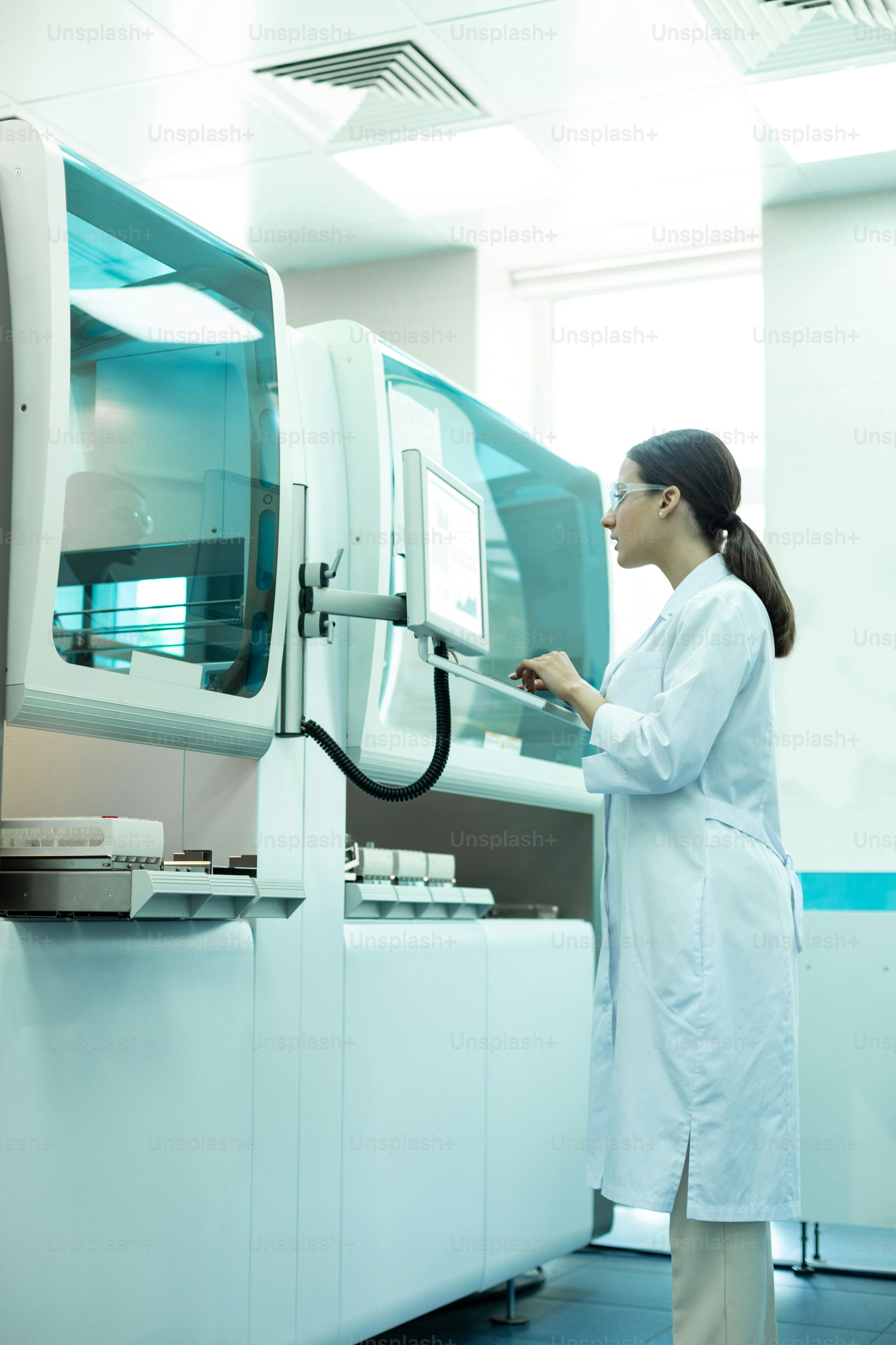 Work with pleasure. Delighted researcher standing in semi position and ...