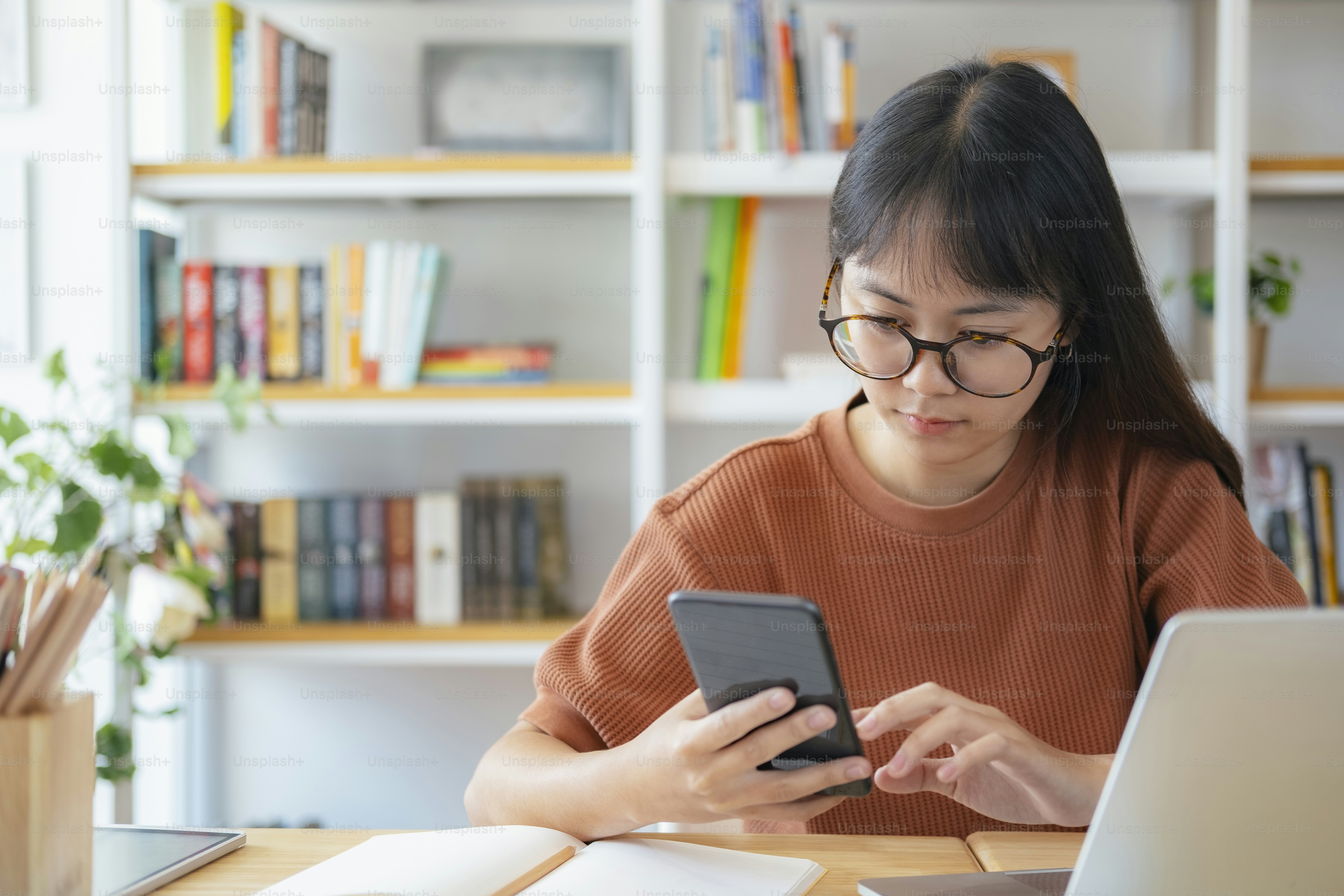 Young woman using tablet. Using online connect technology for business ...