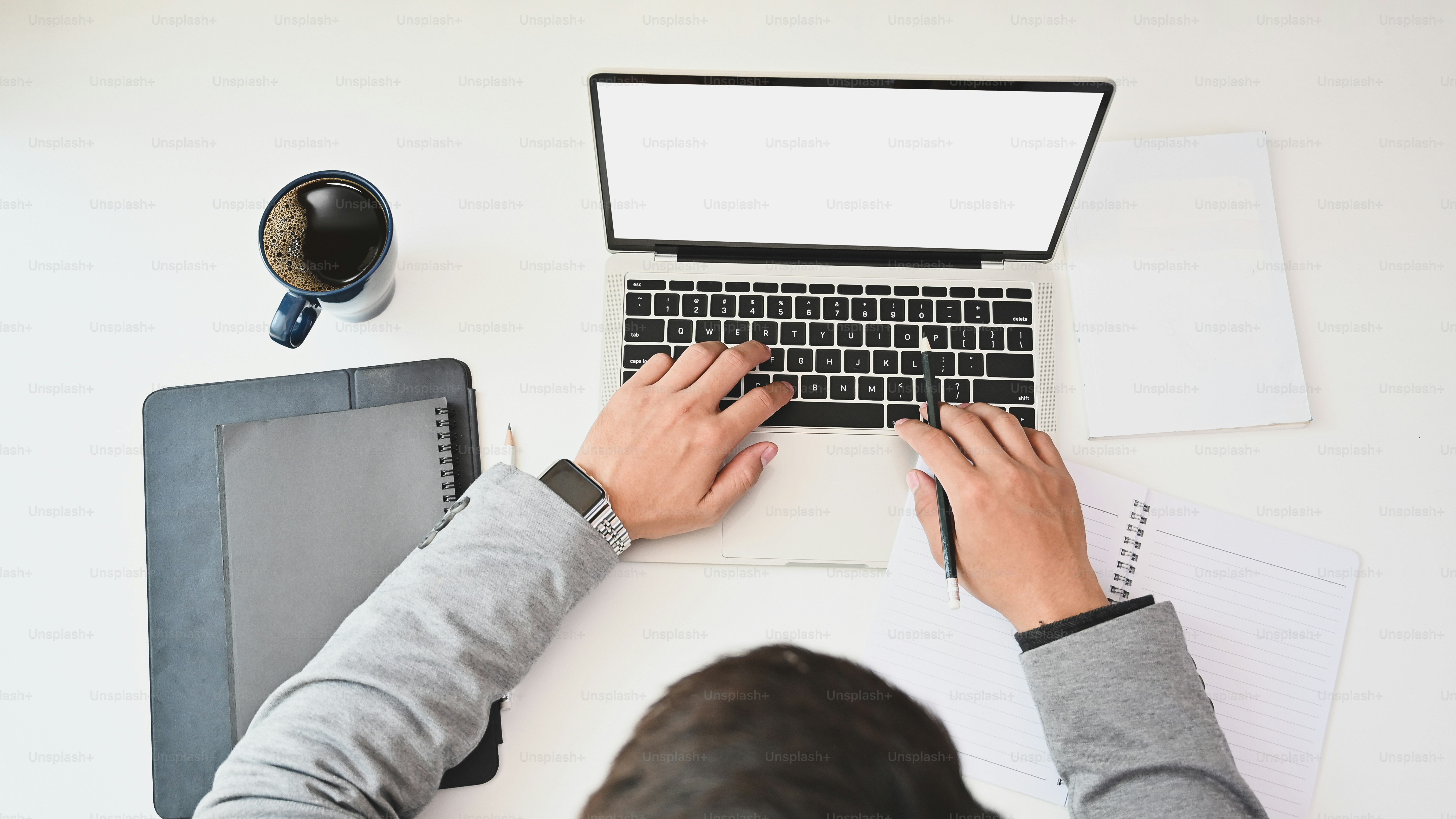 Businessman using isolated white screen laptop with top view on office ...