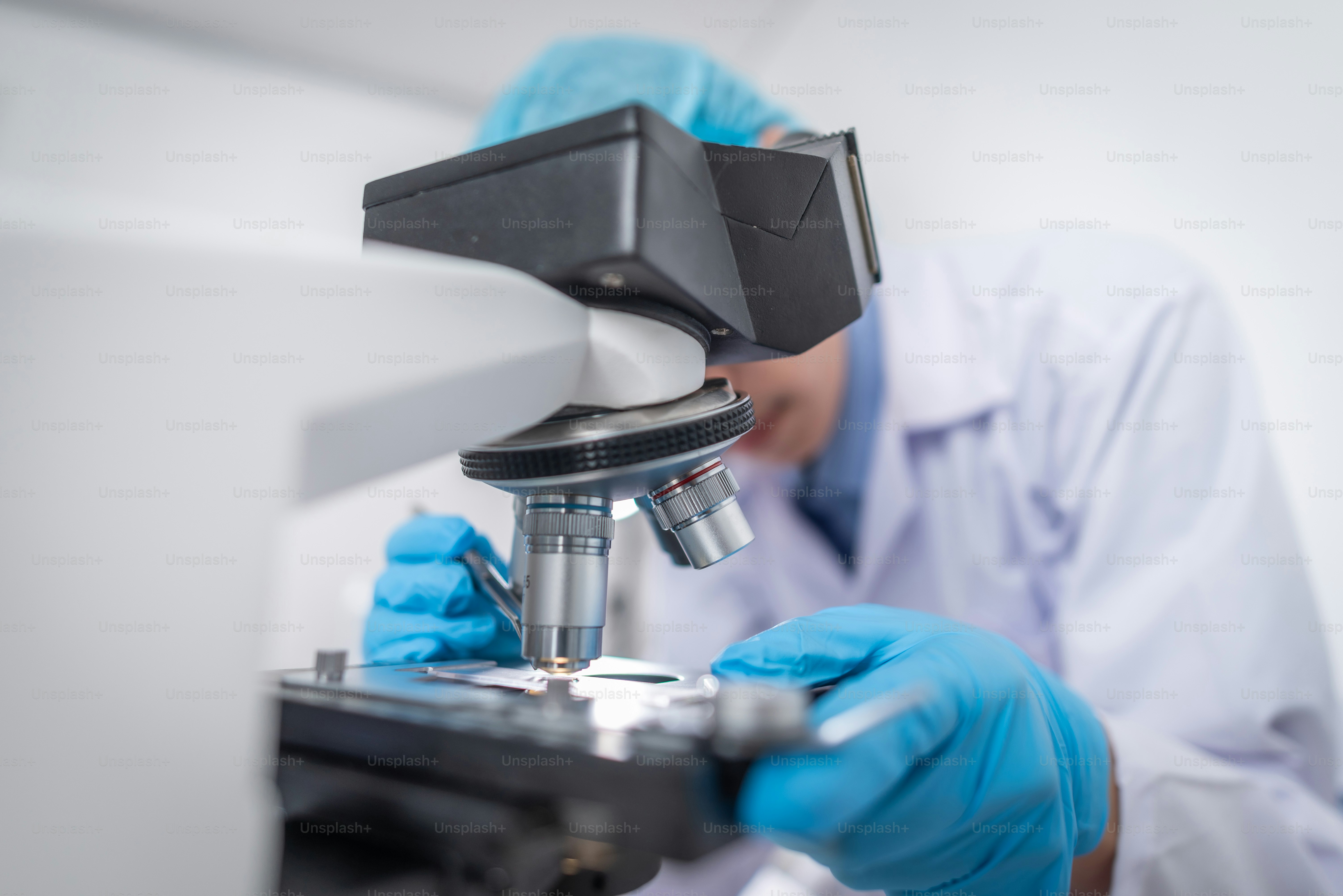 Using a microscope for research in the laboratory, Modern technology ...