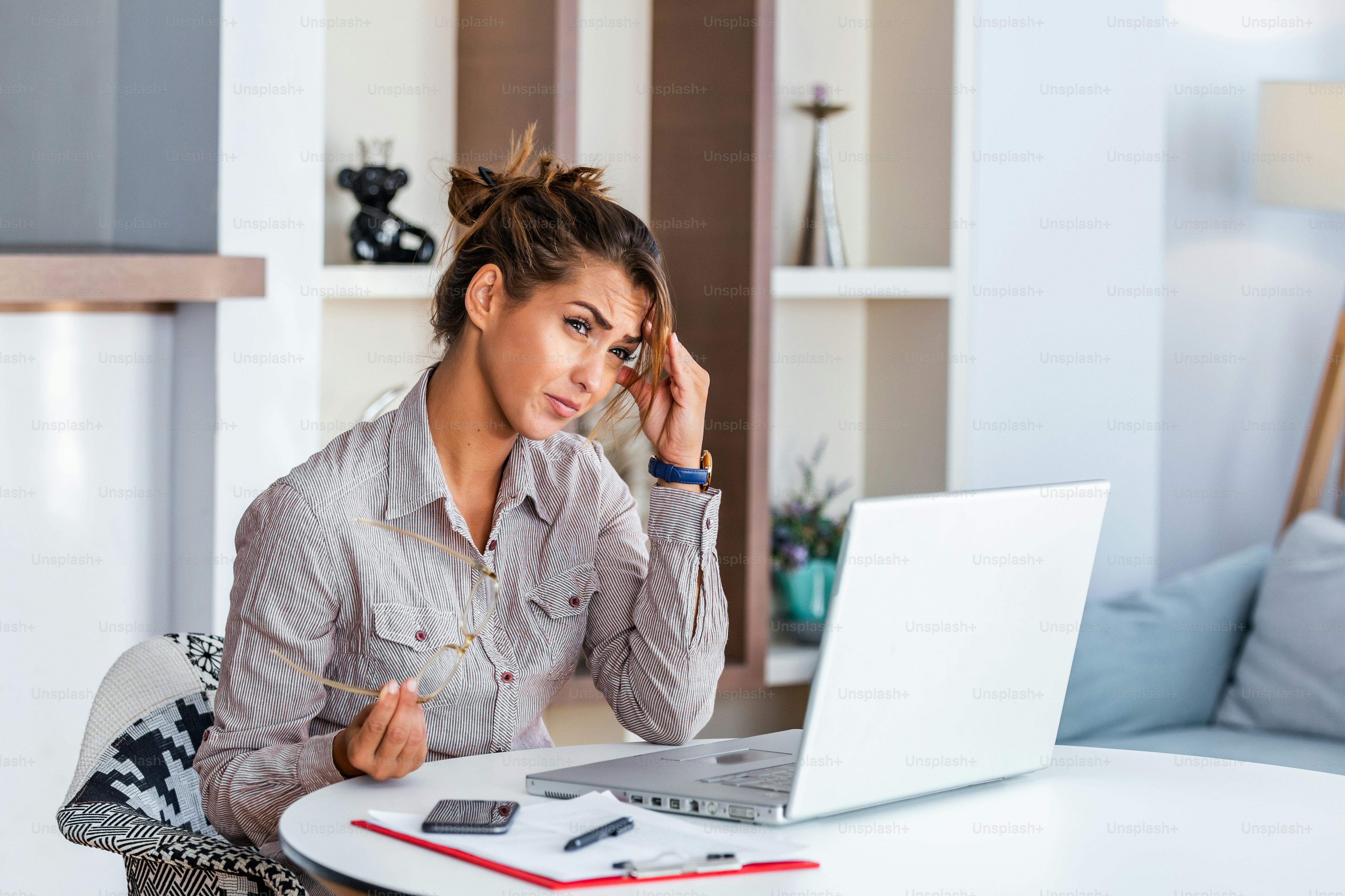 Feeling exhausted. Frustrated young woman looking exhausted while ...