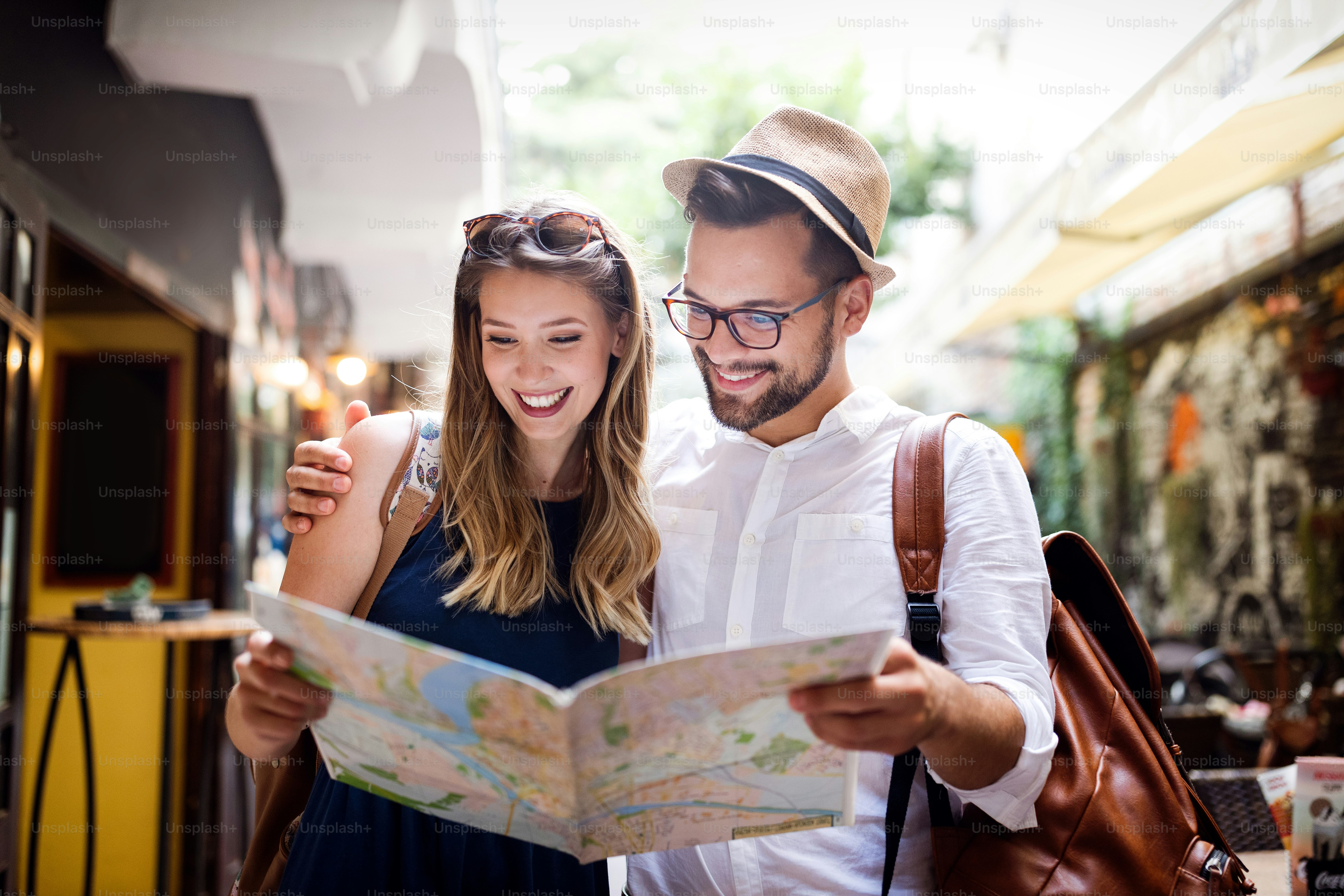 Travel. Tourist couple traveling, Walking on street. Portrait of ...