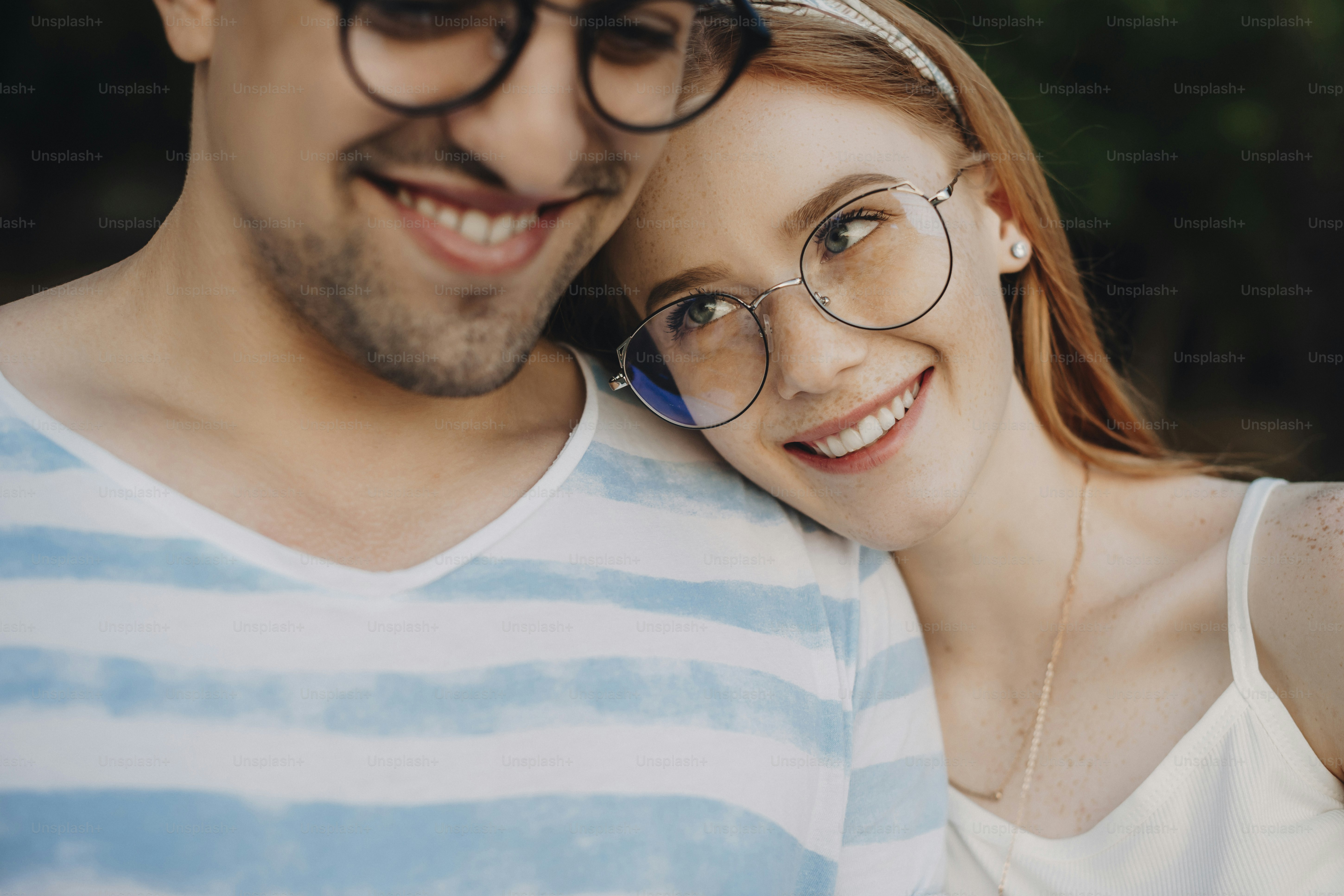 Close up of an attractive young female with red hair and freckles ...