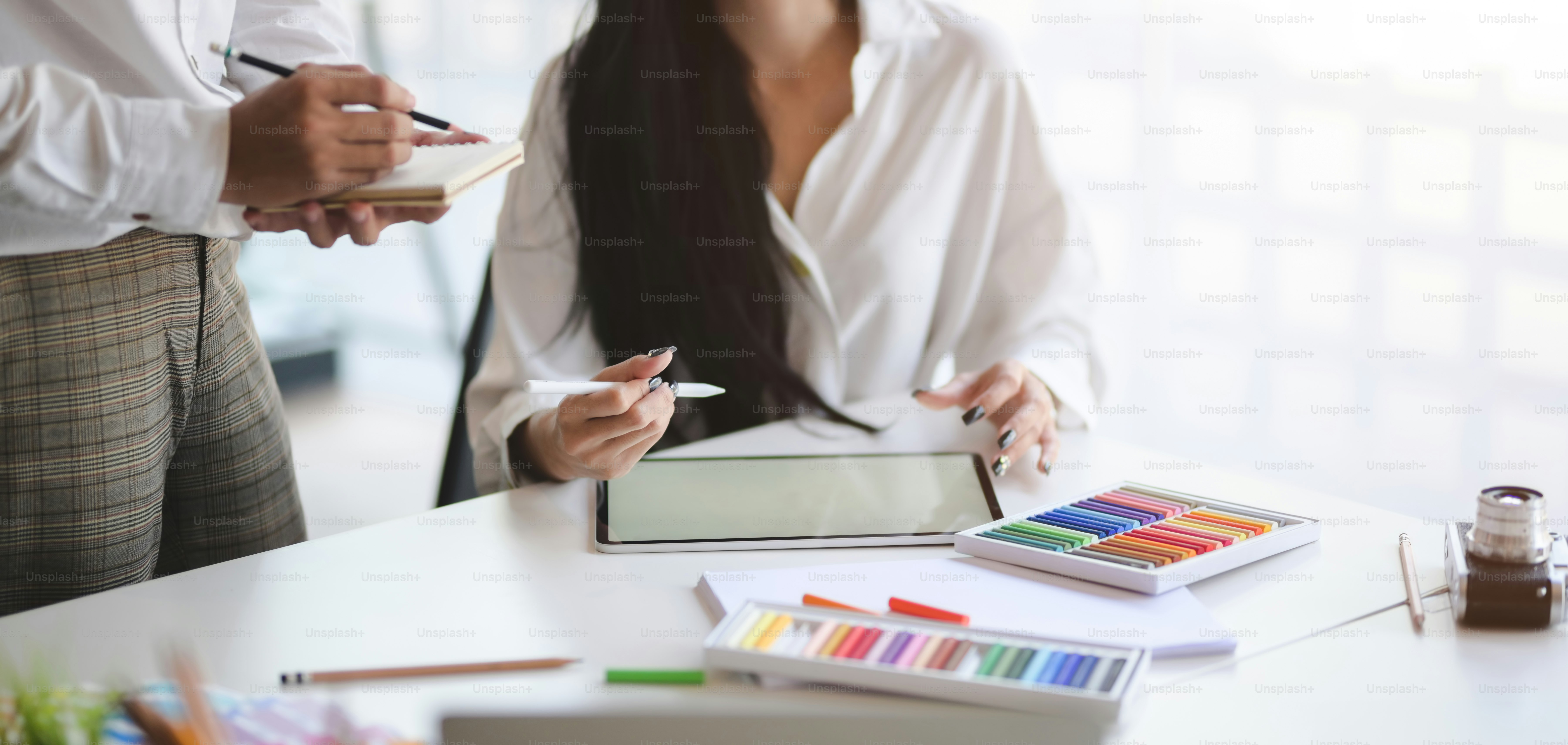 Cropped shot of young professional designer team drafting the project ...