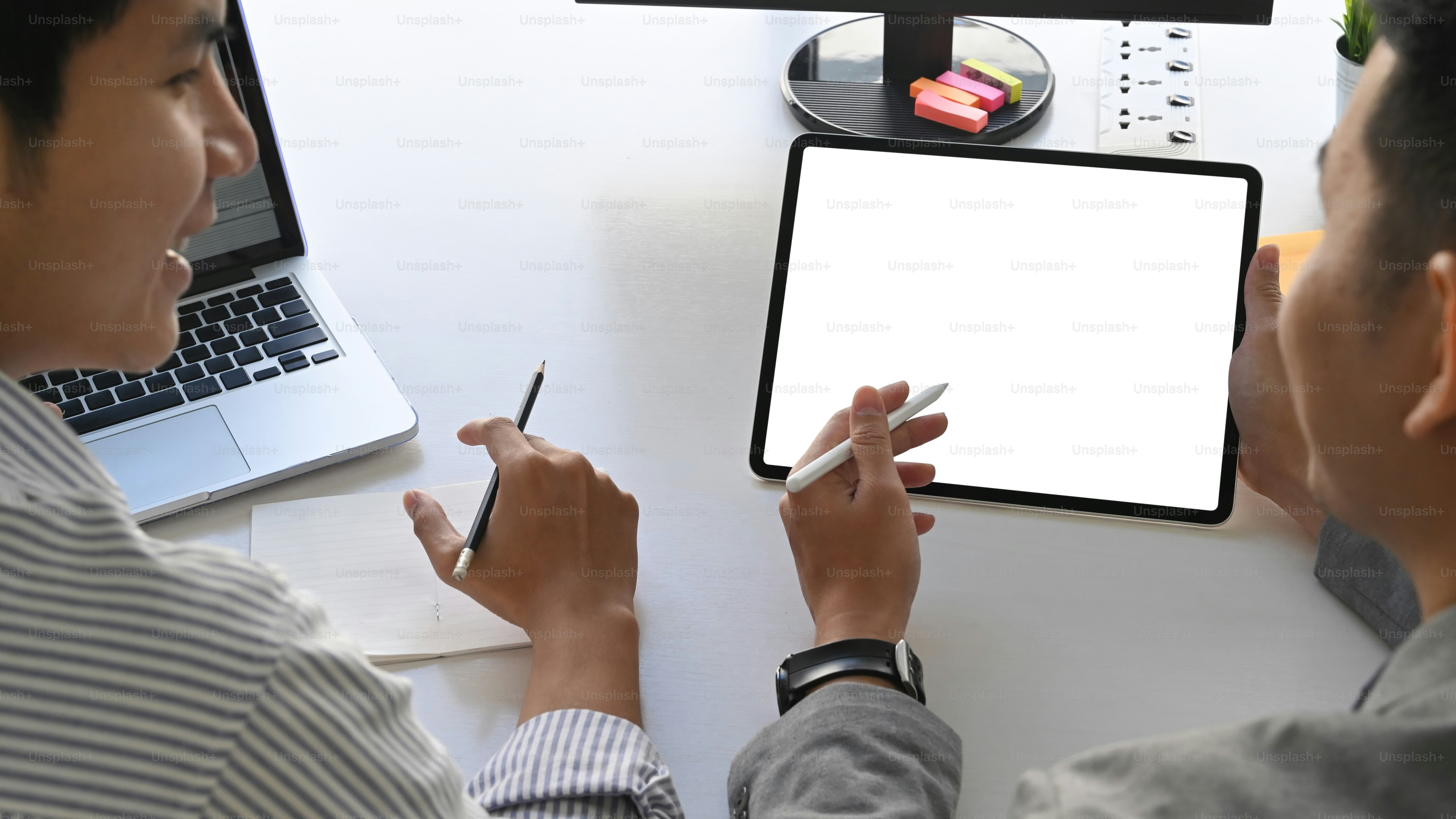 Programmers meeting with developer workspace and empty screen mockup ...