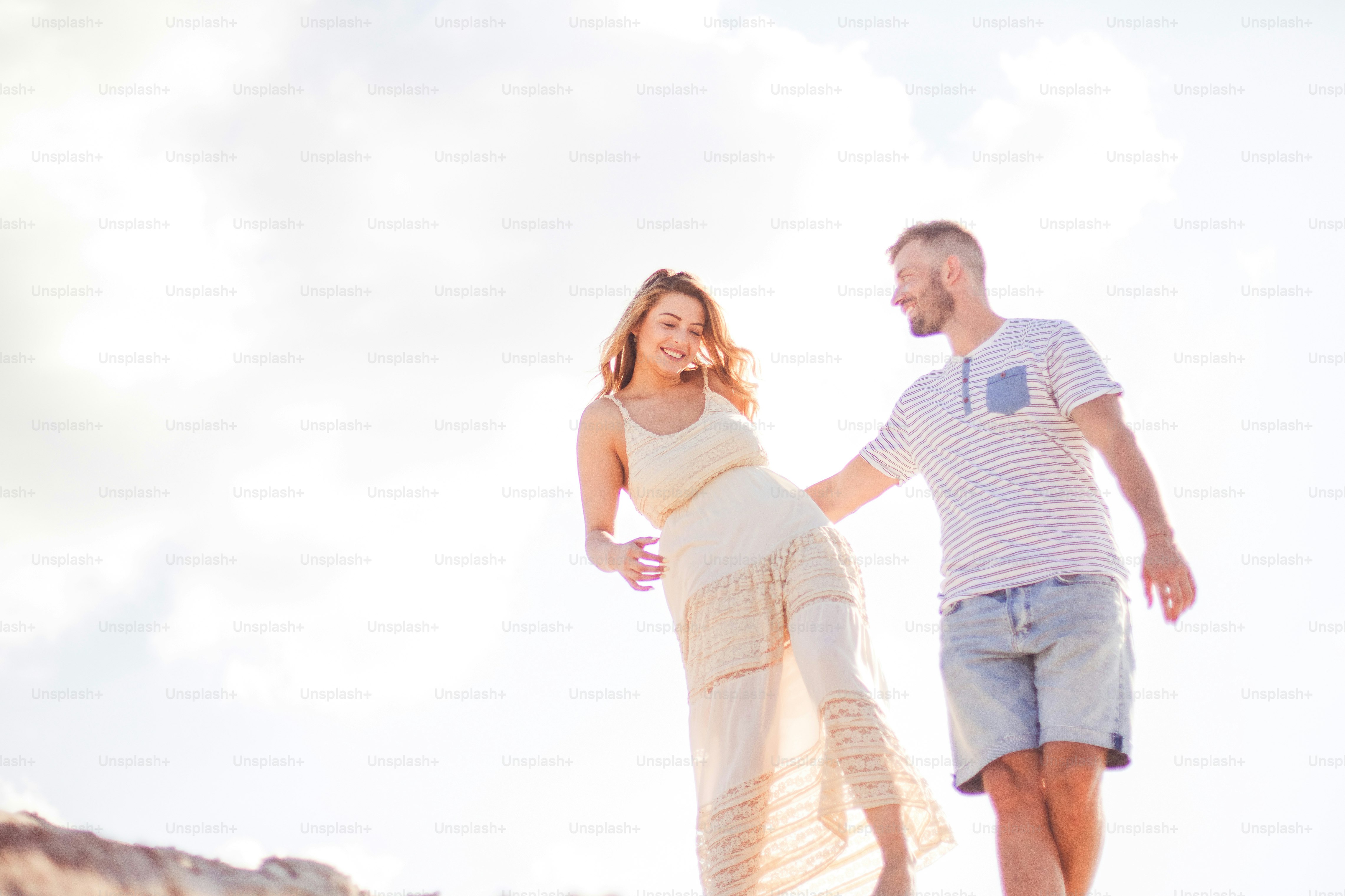 They enjoy long walks. Young couple in nature. photo – Two people ...