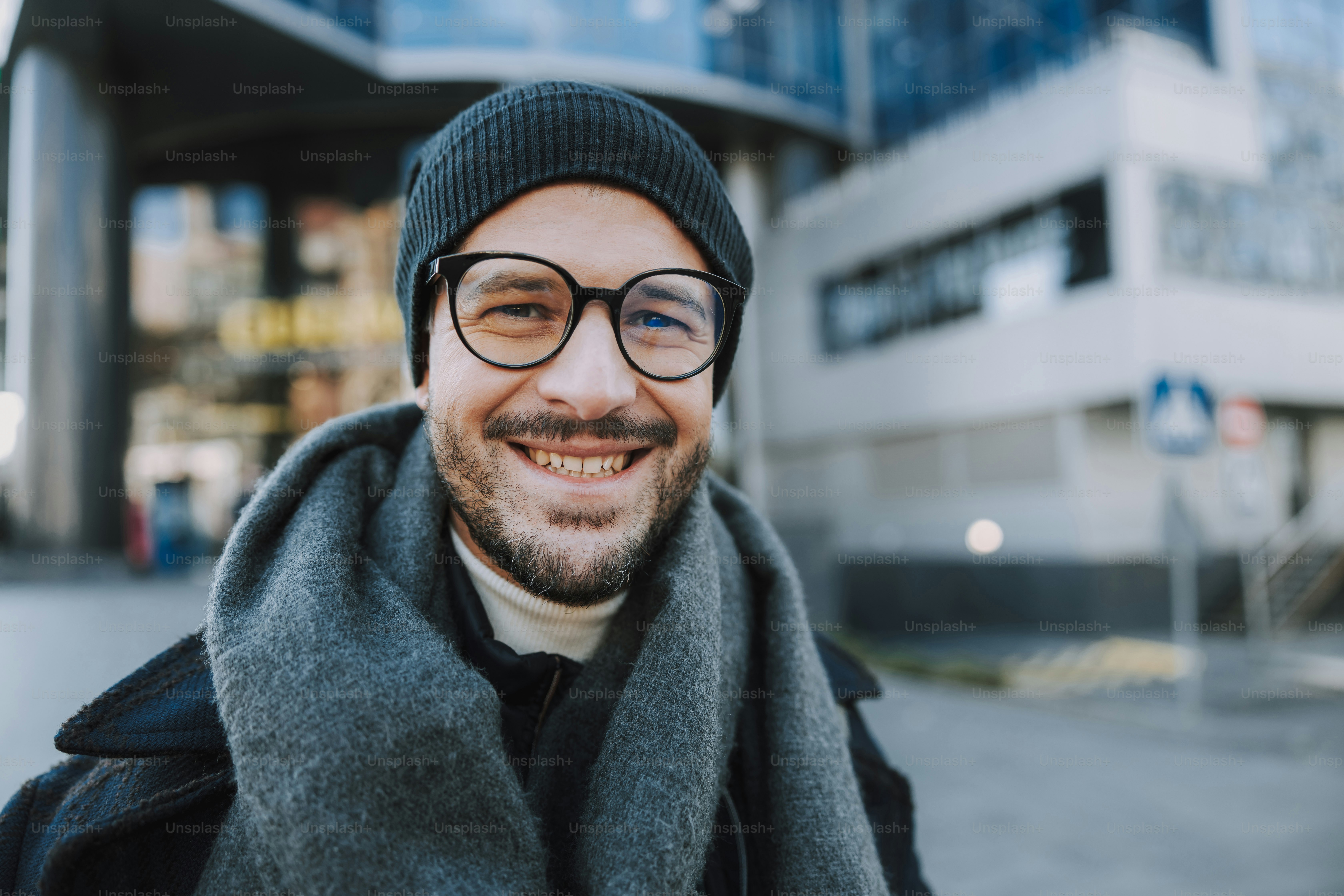 Adult bearded male posing for camera outside. City lifestyle concept ...
