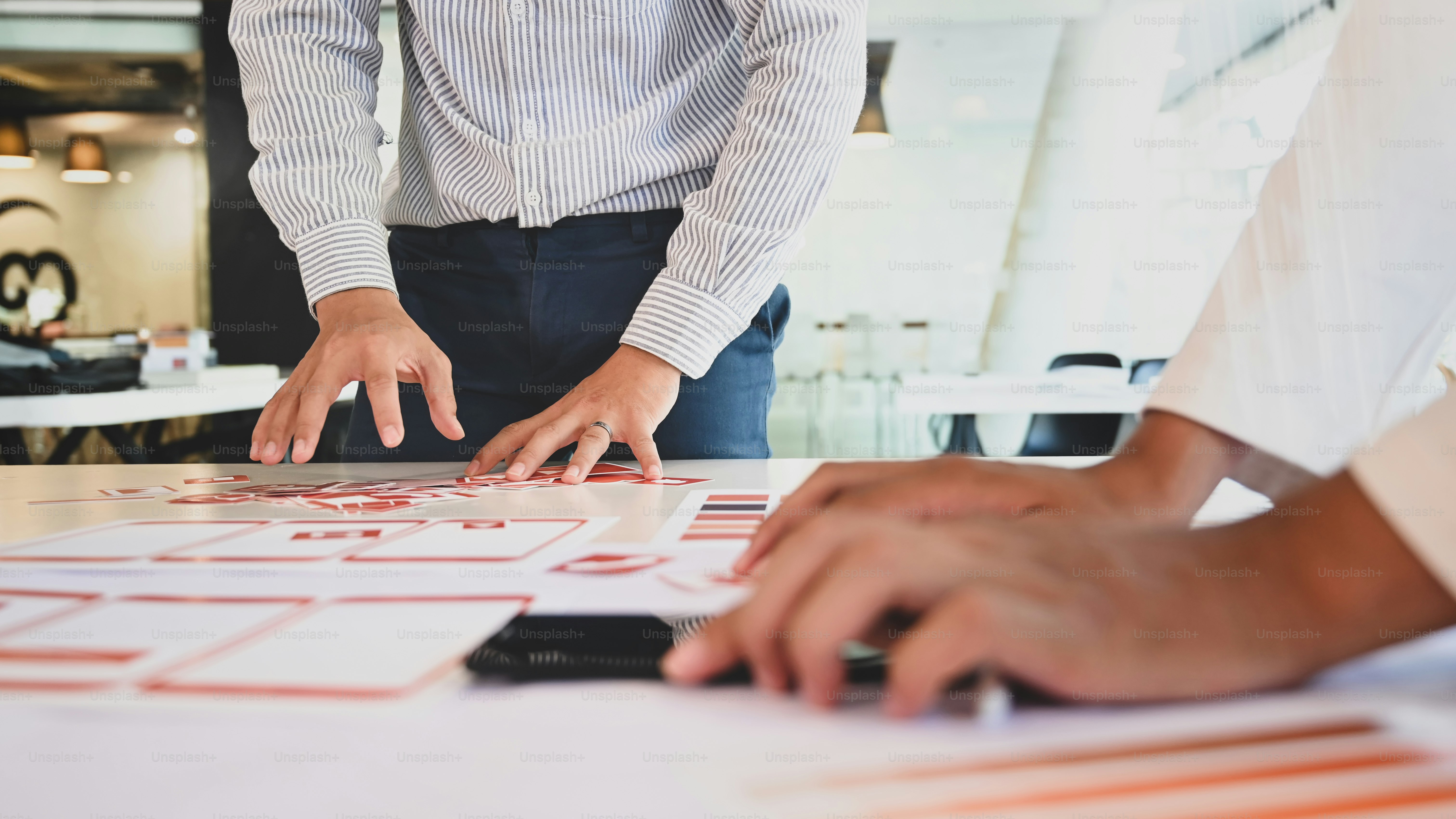 App developer Ux Ui designing with paper model on mobile application ...
